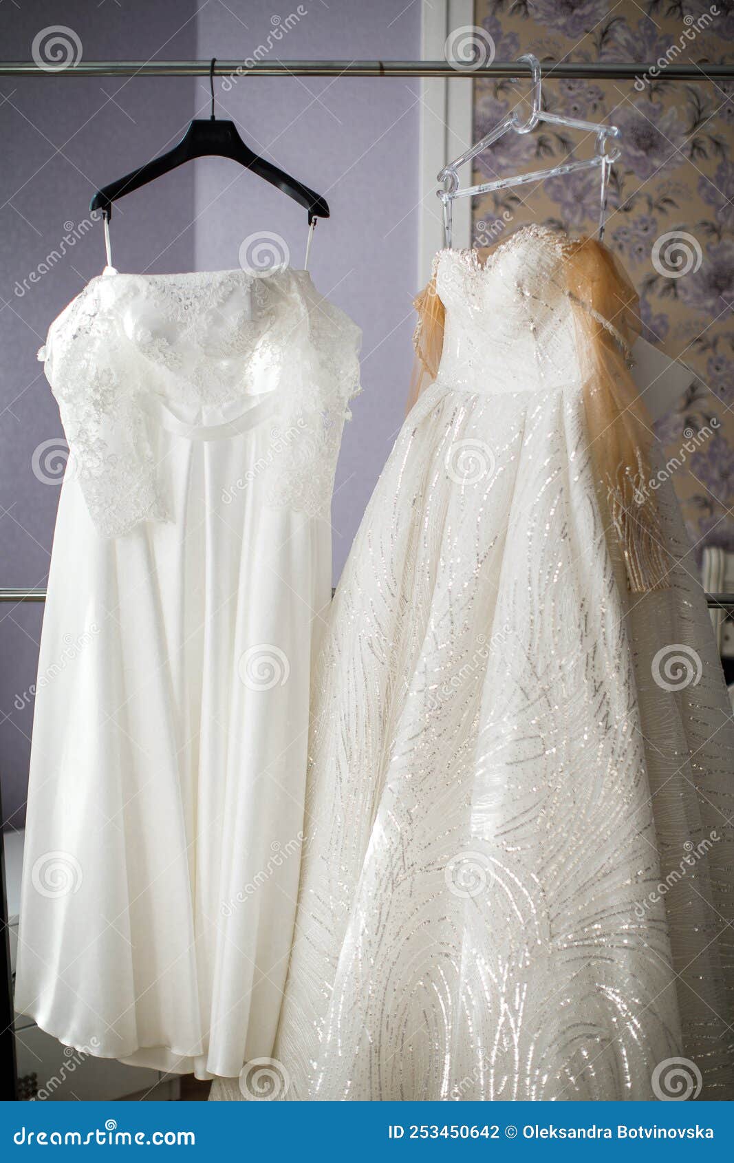 Two Wedding Dresses Hanging on a Hanger Stock Photo - Image of satin ...