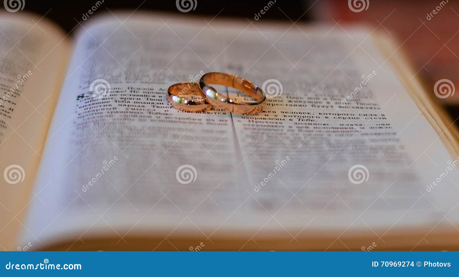 Two Wedding Rings on a Bible Stock Photo - Image of circle, ring: 70969274