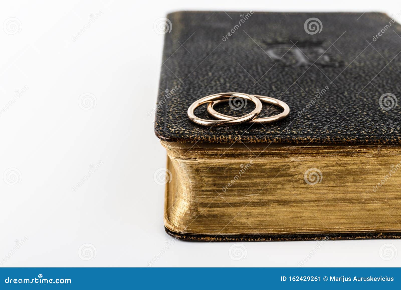 Two Wedding Rings on a Bible Stock Image - Image of macro, marriage ...