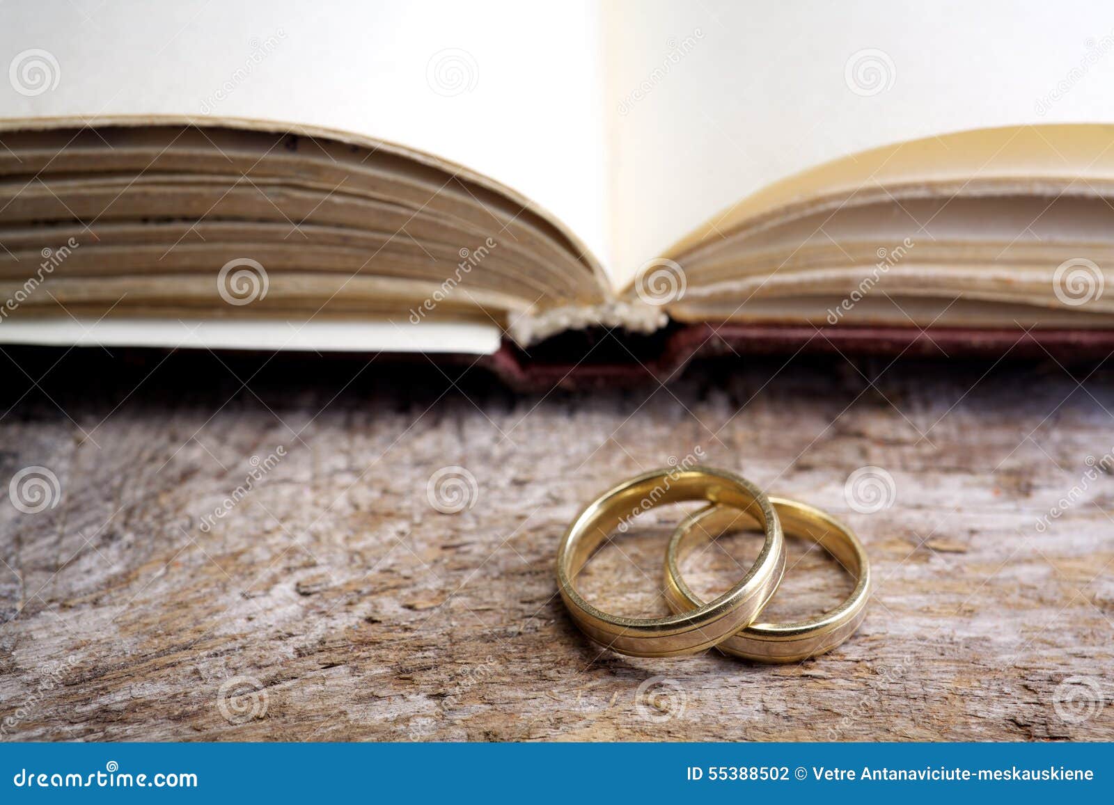 Two Wedding Rings with a Bible Stock Photo - Image of ceremony, paper ...