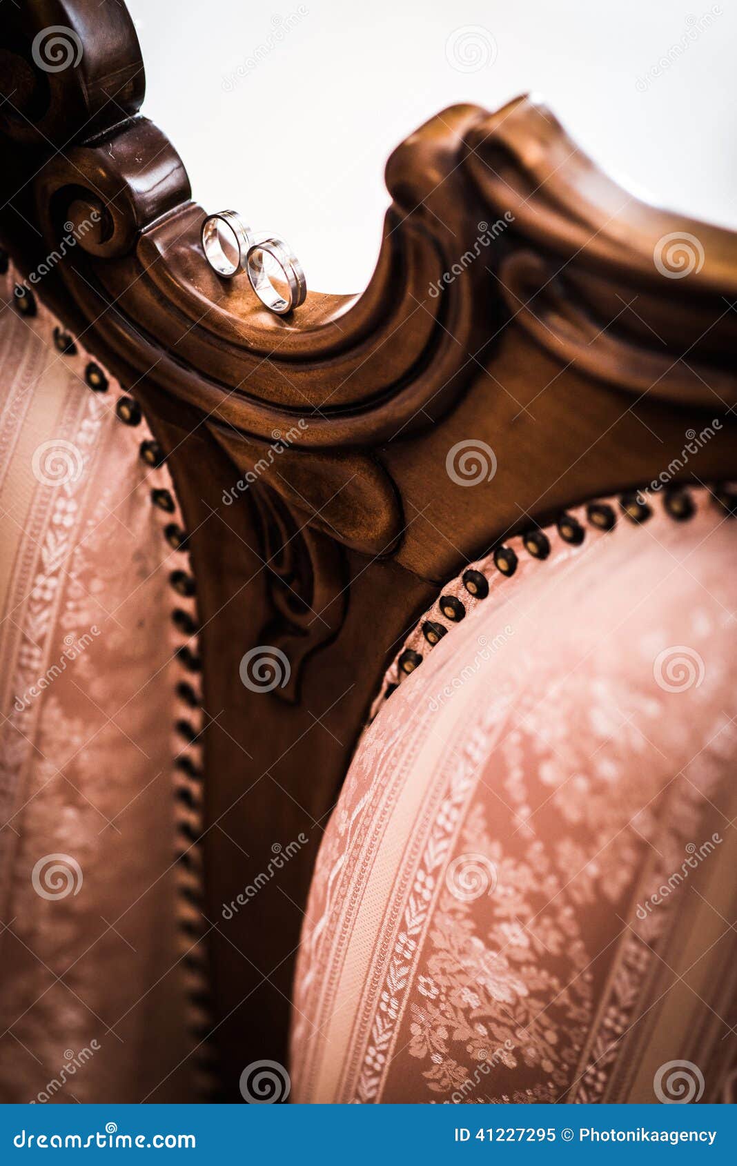 Two Wedding rings on chair stock image. Image of copy - 41227295