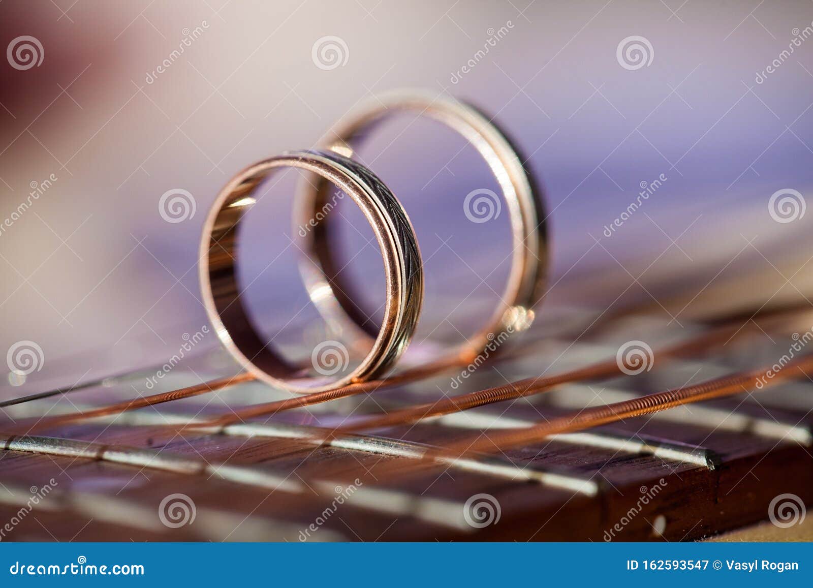 Two Wedding Rings on Guitar Strings. Shallow Depth of Field Stock Image ...