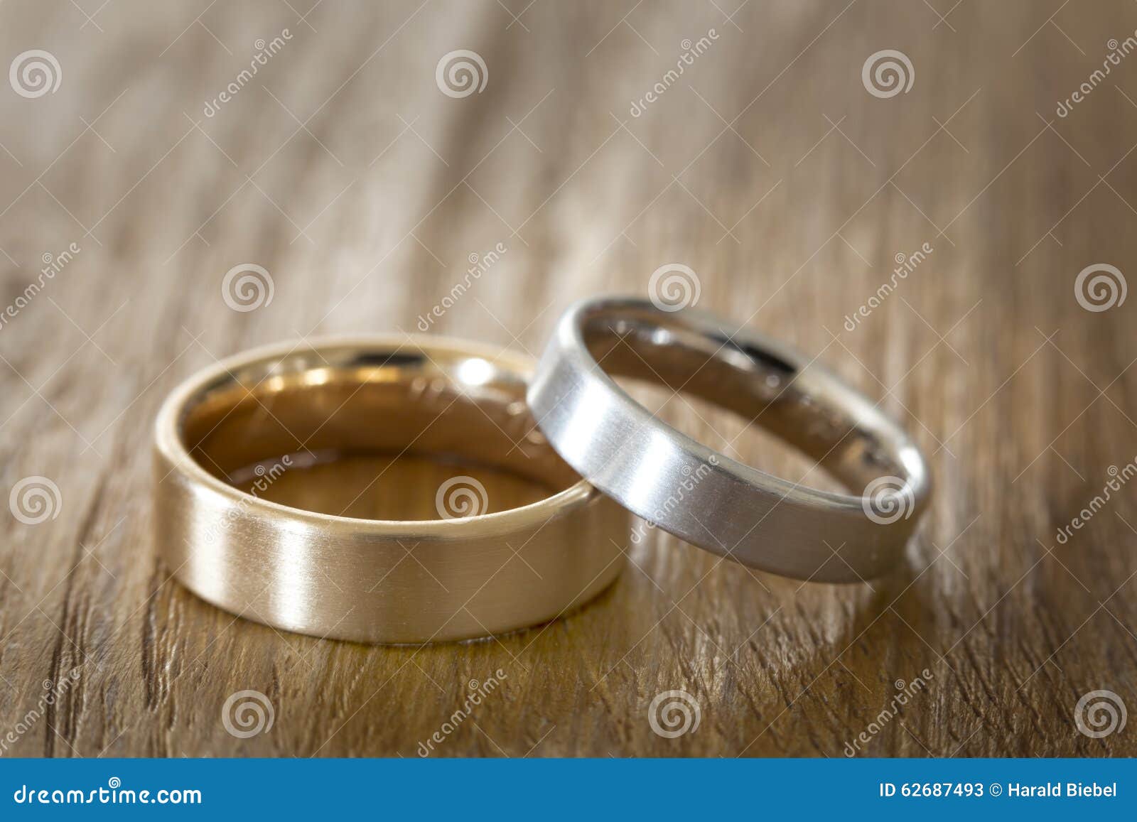 Two Wedding Rings on a Wooden Surface Stock Image - Image of unity ...