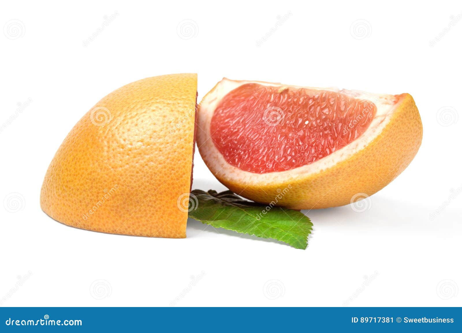 Two Wedges of Grapefruit on White Background with Green Leaf Stock ...