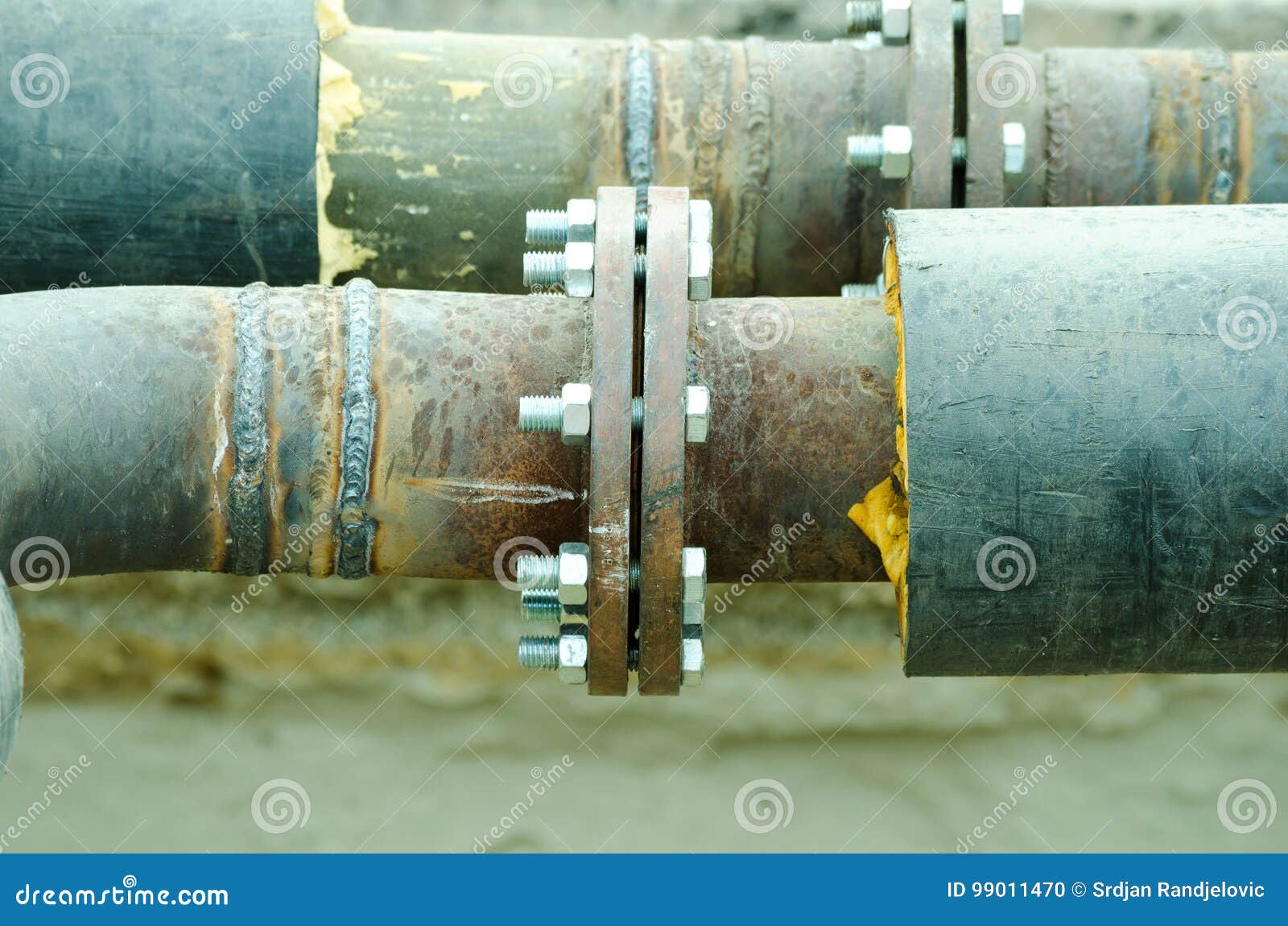 Two Welded Pipes with Bolts and Insulation Close Up Stock Photo - Image ...