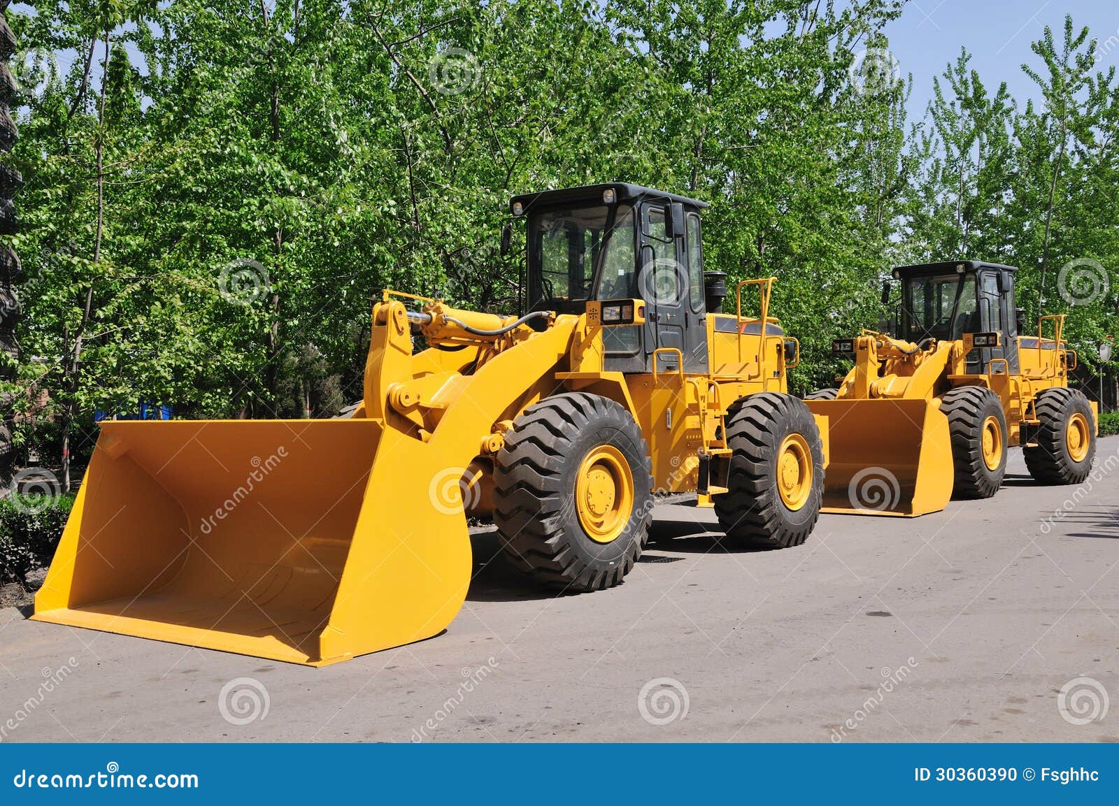 Big Loader Machine With Steel Metal Chains Removing Big Snow Pile From ...