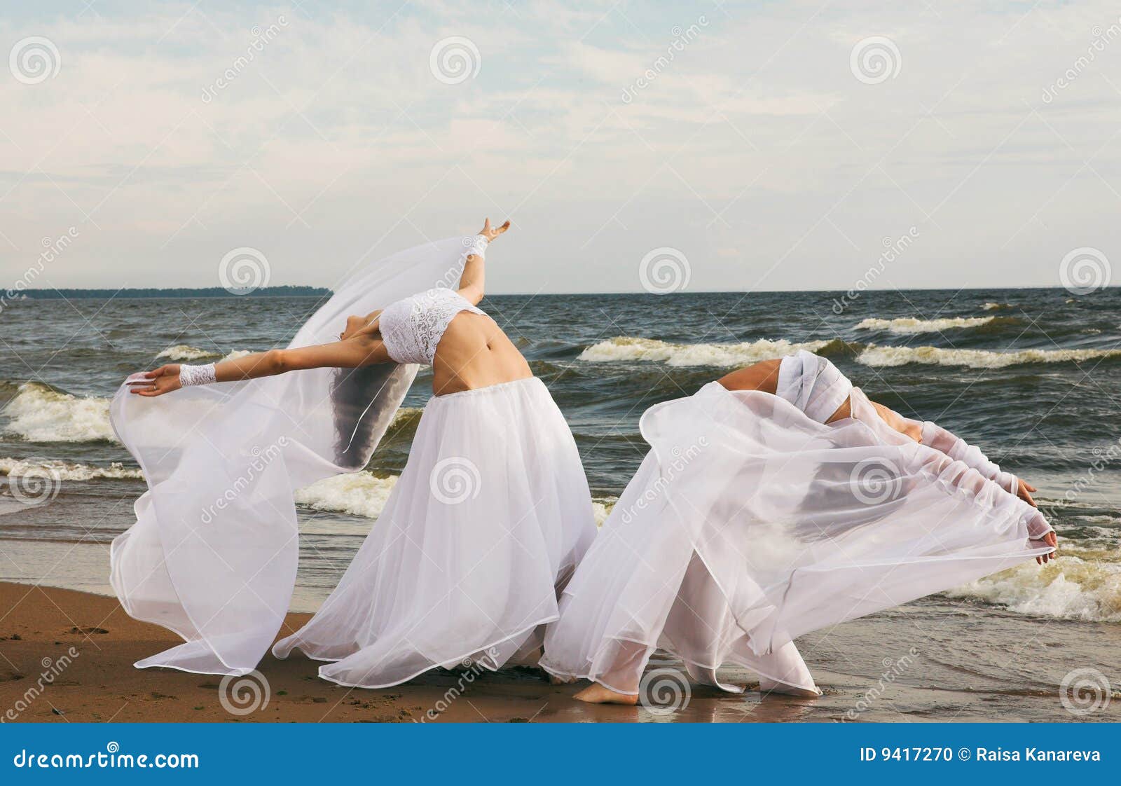 Two White Angels on the Beach Stock Photo - Image of model, barefoot ...