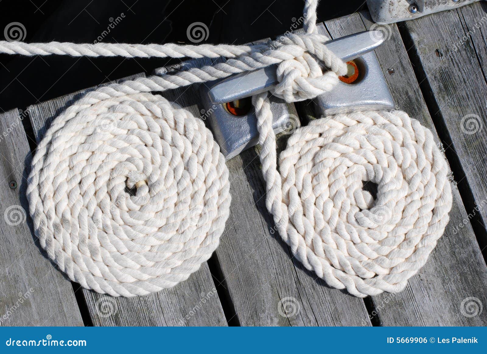 Two White Boat Ropes Coiled Up Stock Photo - Image of circle, dock: 5669906