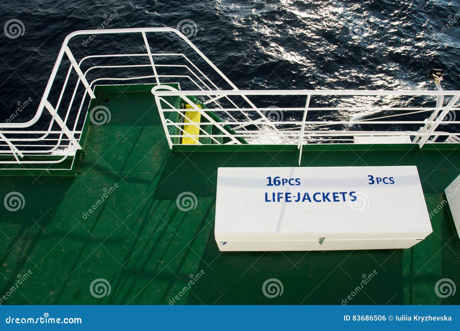 Two White Boxes with Life Jackets on Deck of Passenger Ship Stock Photo ...