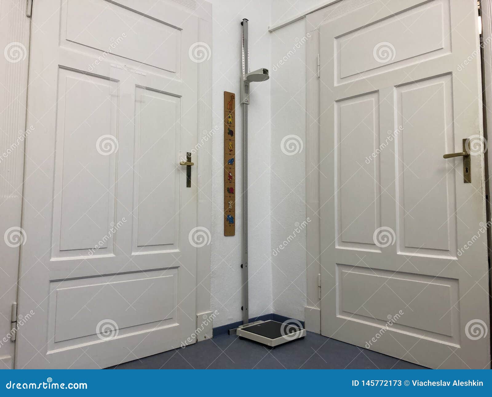 Two White Doors and a Height Meter Stock Image - Image of doorway ...