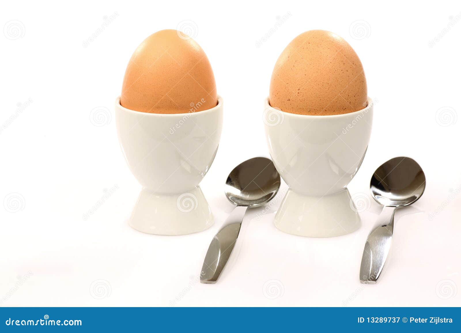 Two White Egg Cups with Brown Eggs Stock Image - Image of food, eggs ...