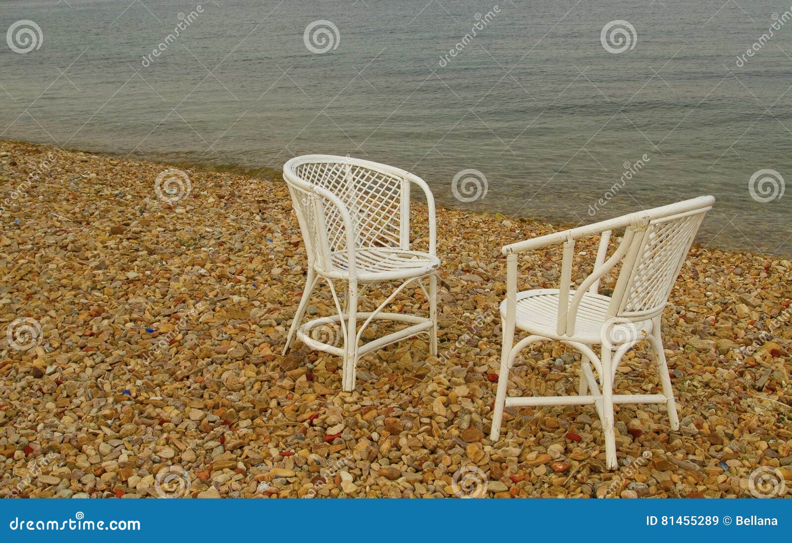 Two White Empty Chairs on the Beach Stock Image - Image of pebble ...