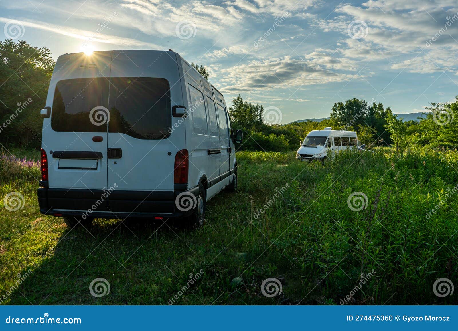 Two White Motor Home Camping in the Forest Stock Photo - Image of ...
