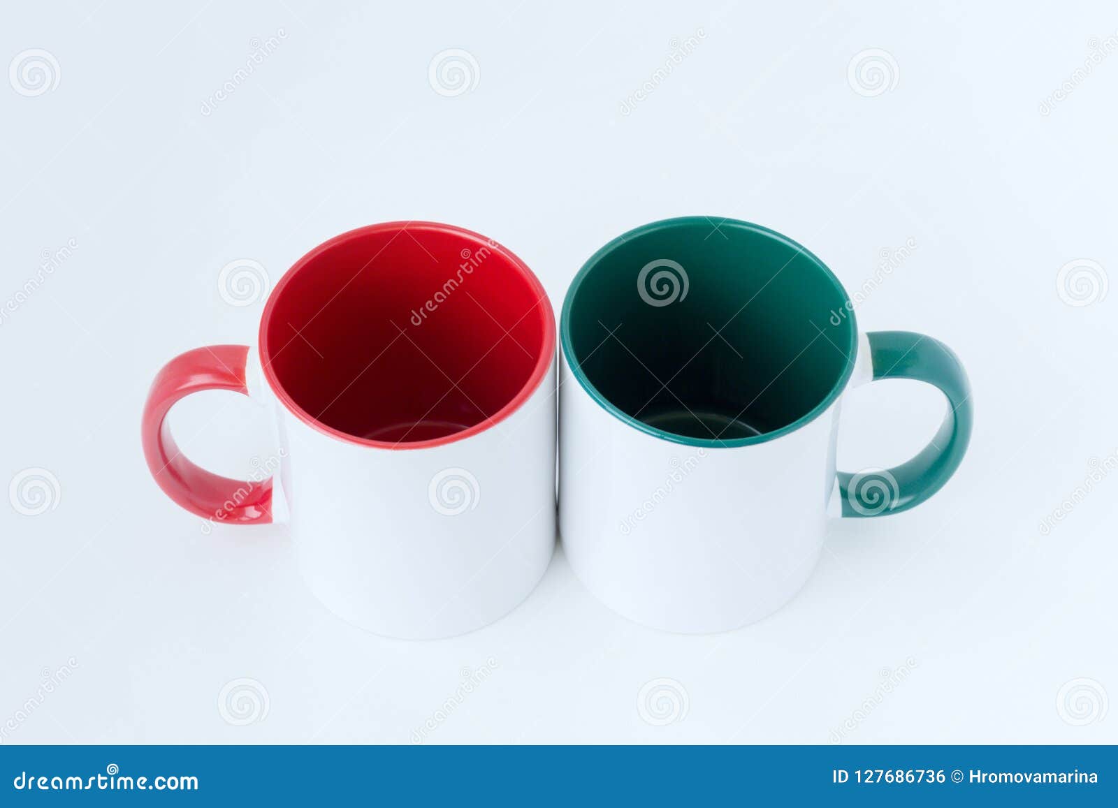 Two Mugs, with a Green and Red Handle on a Light Background. Stock ...