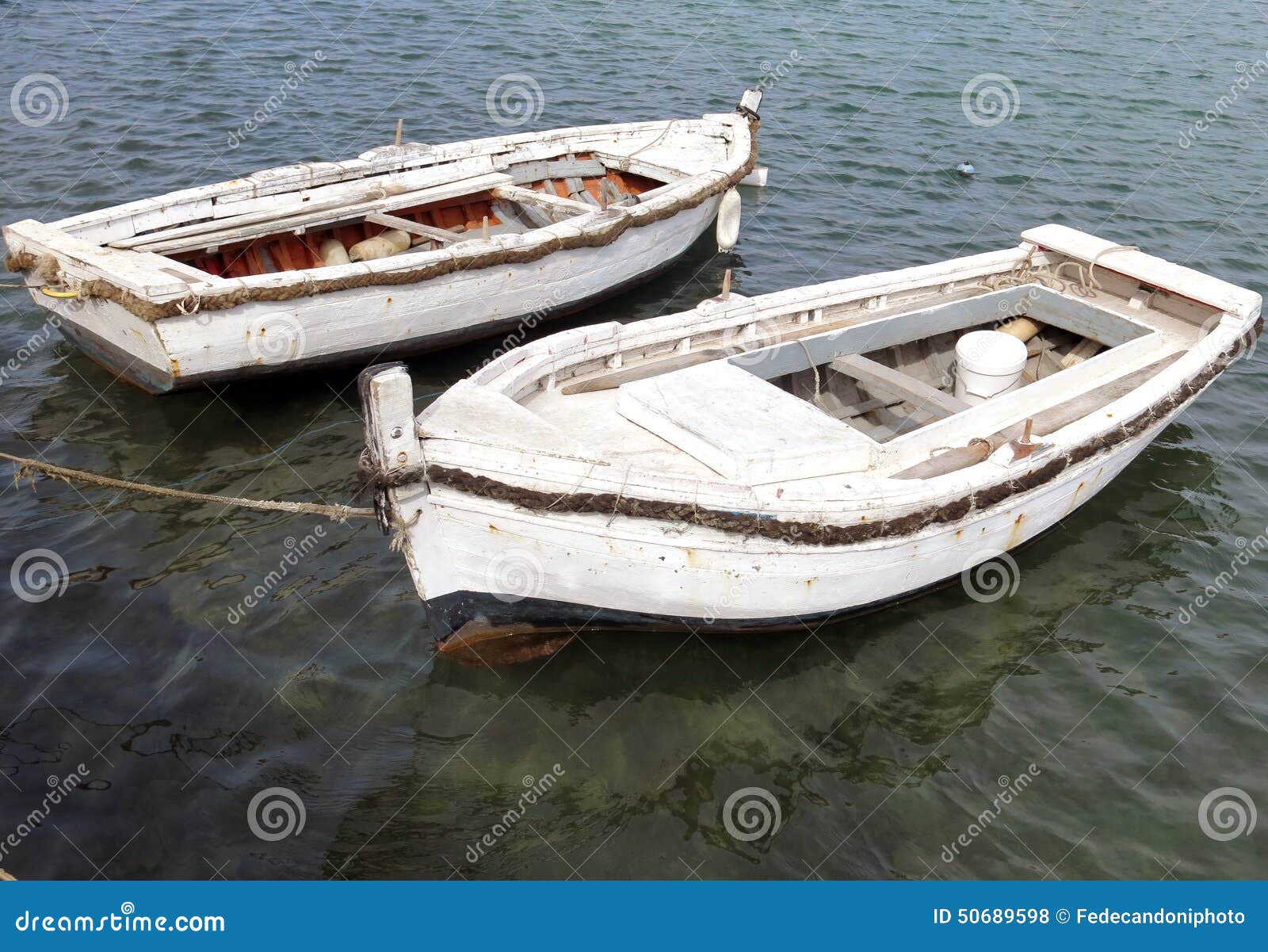 Two White Old Boats in the Middle of the Water Stock Photo - Image of ...