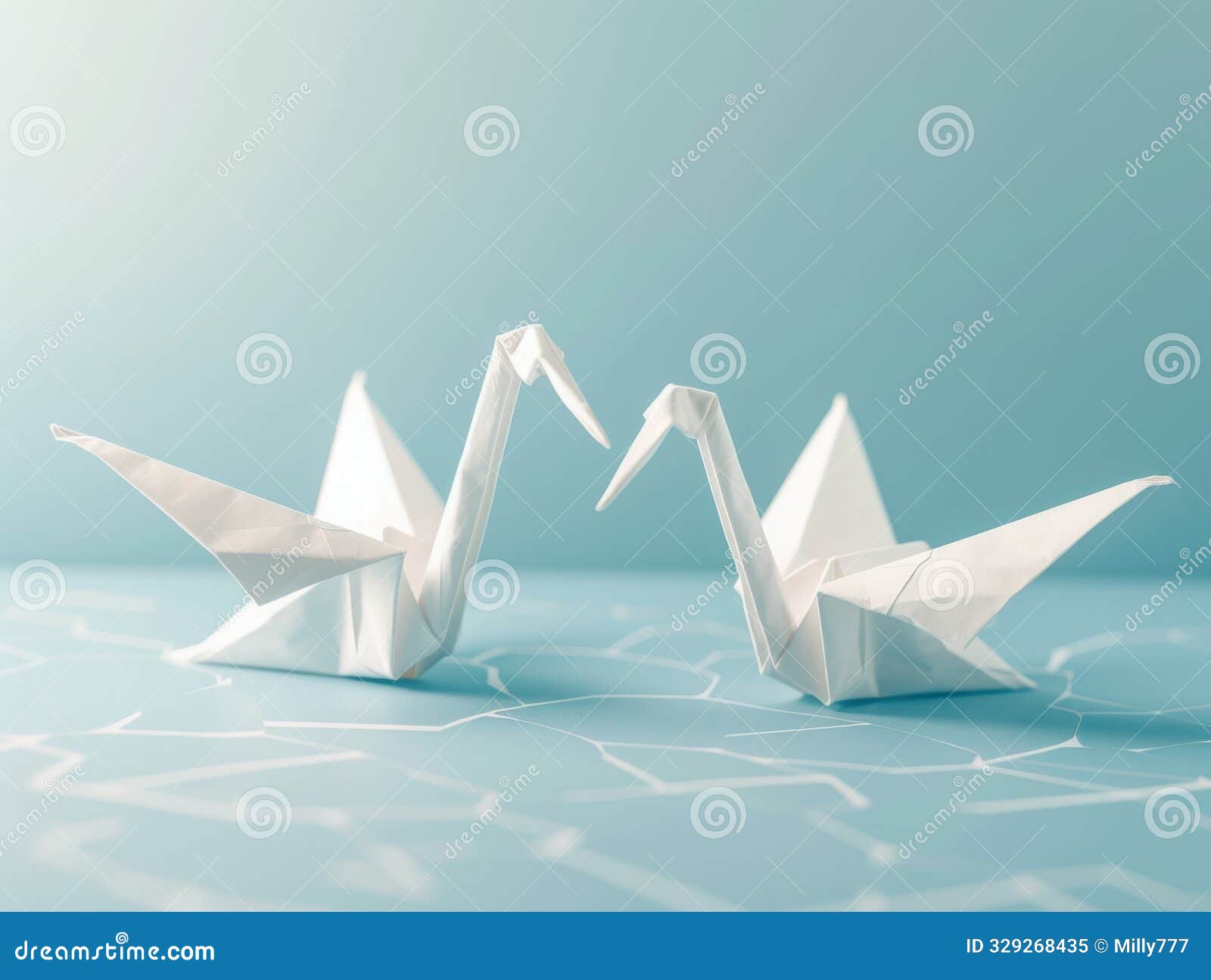Two White Origami Cranes in Love Dancing on a Blue Background Stock ...