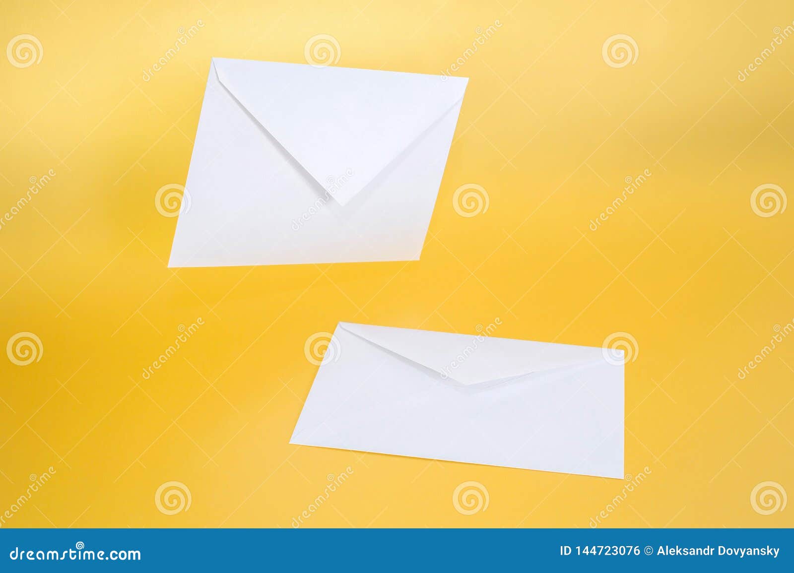 Two White Paper Envelopes on a Plain Background Stock Photo - Image of ...