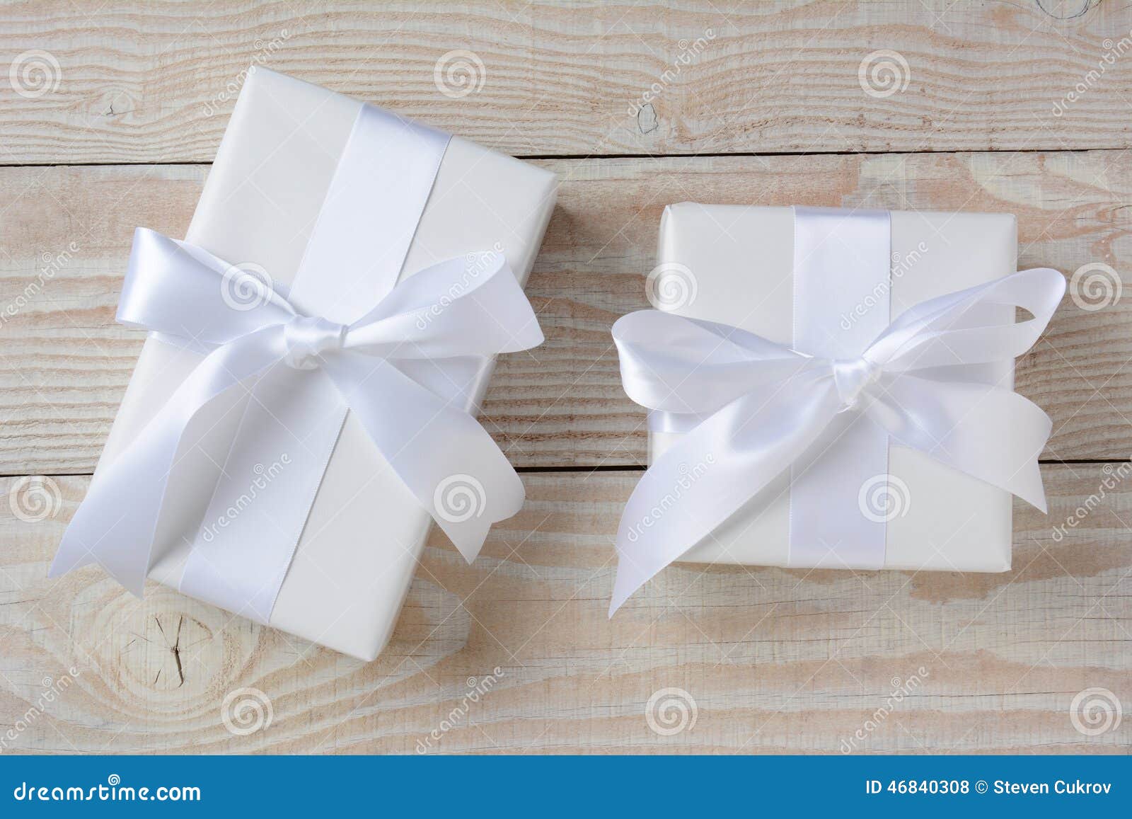 Two White Presents stock photo. Image of bows, ribbon - 46840308
