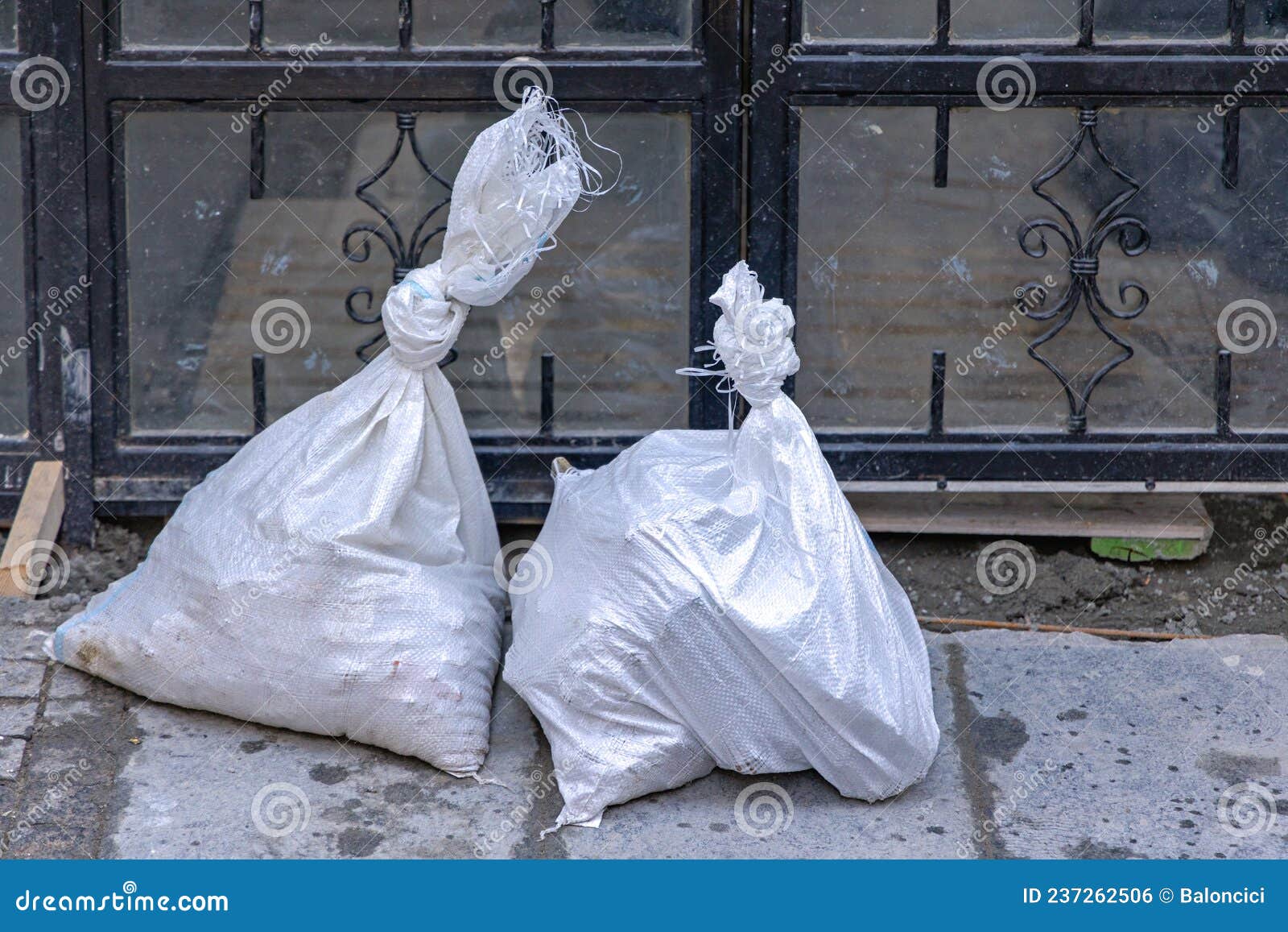Two White Sacks stock photo. Image of city, sacks, building - 237262506