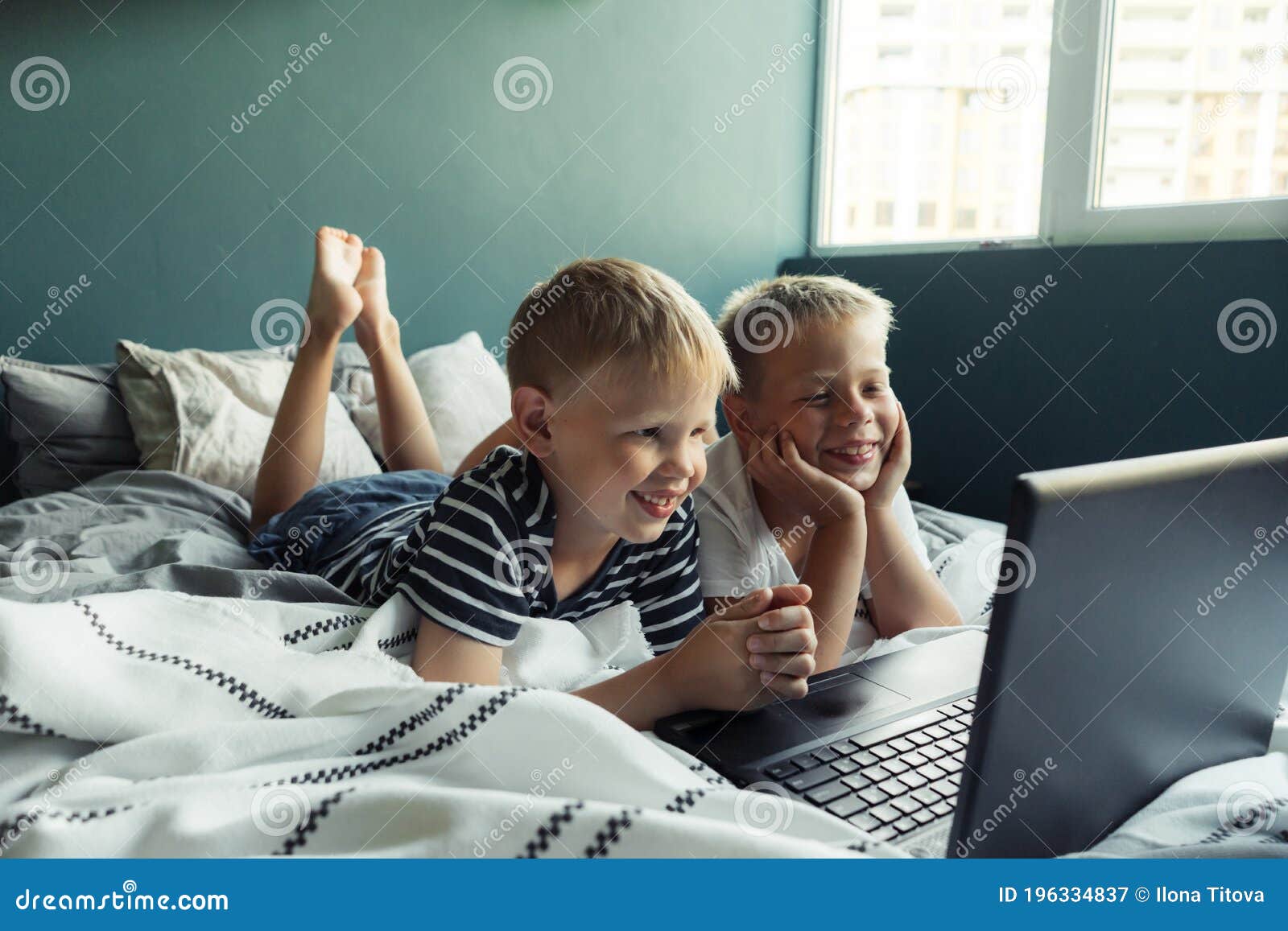 Two White Schoolboy Boys Enjoy and Study with a Laptop Stock Image ...