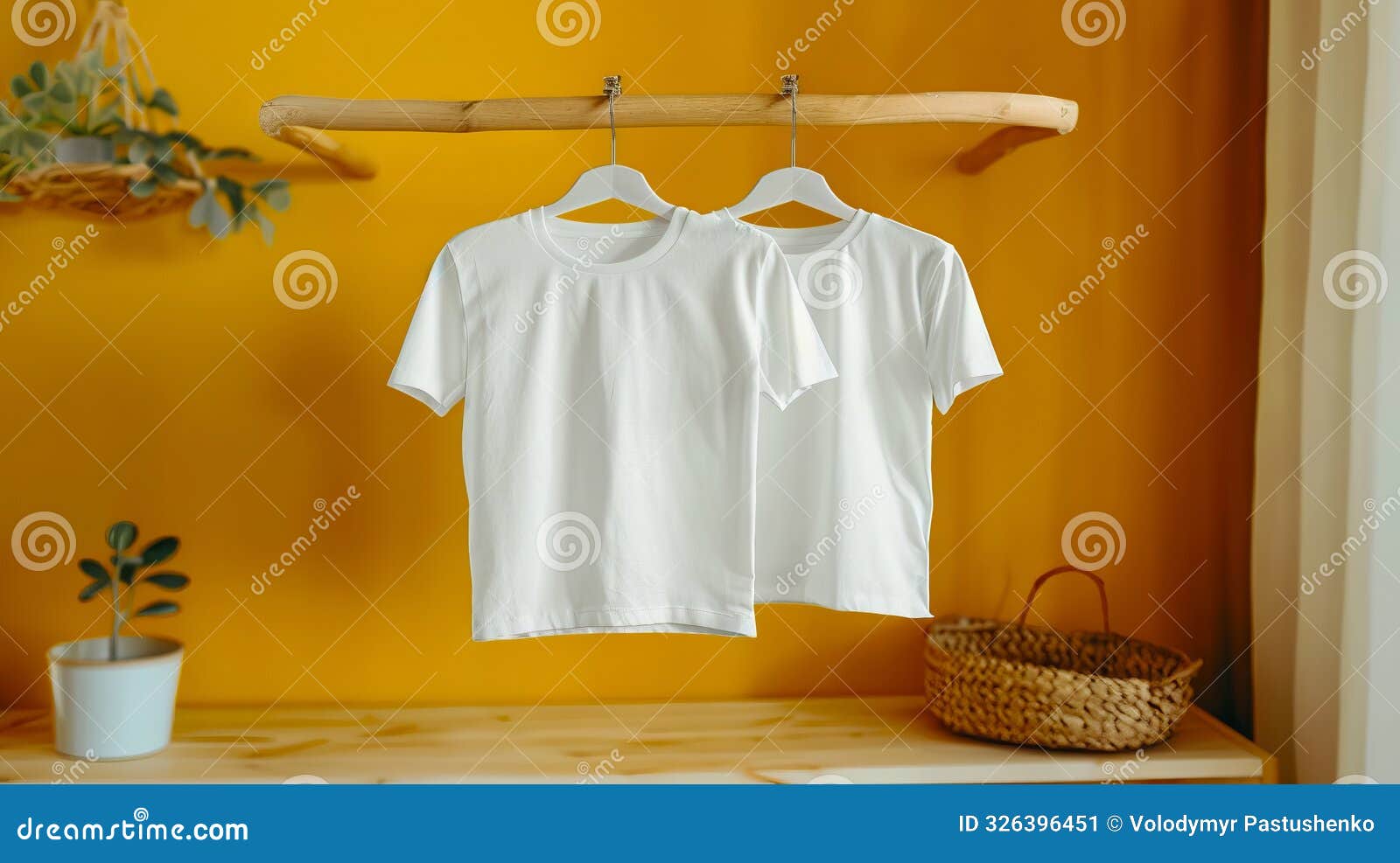 Two White T - Shirts Hanging on a Clothes Rack Stock Image - Image of ...