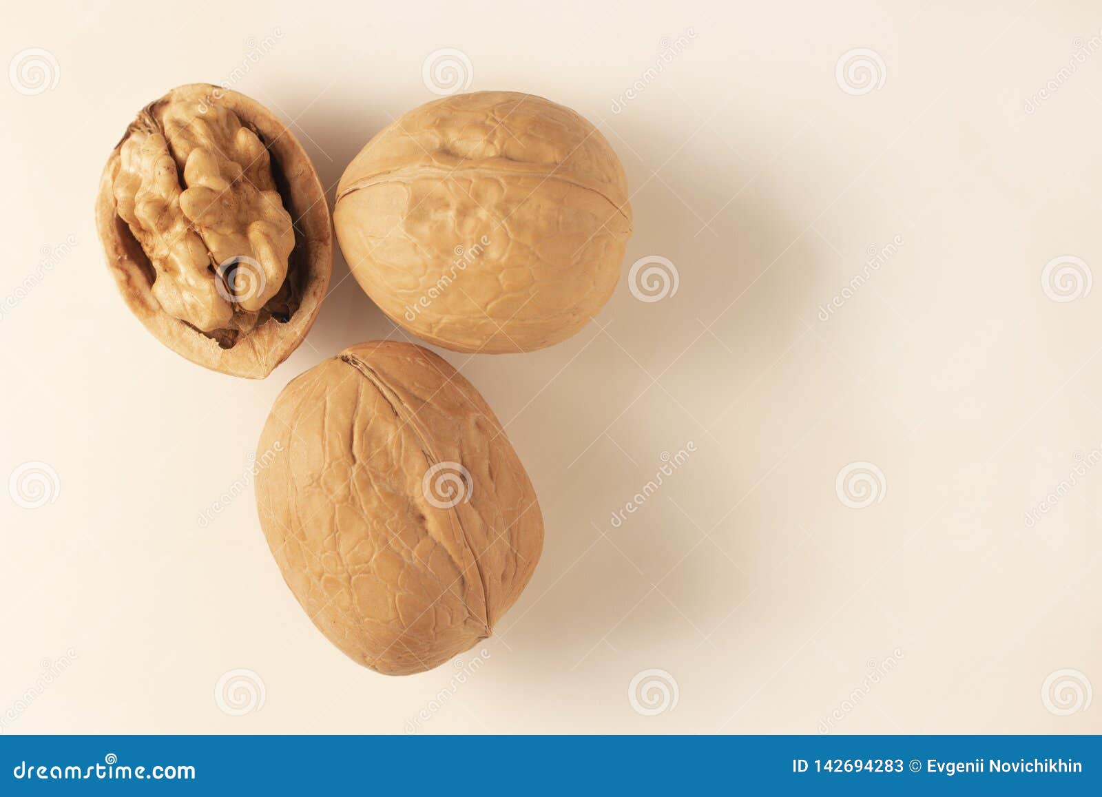 Split Walnut With A Clay Bowl Full Of Nuts On A Dark Rustic Table Stock ...