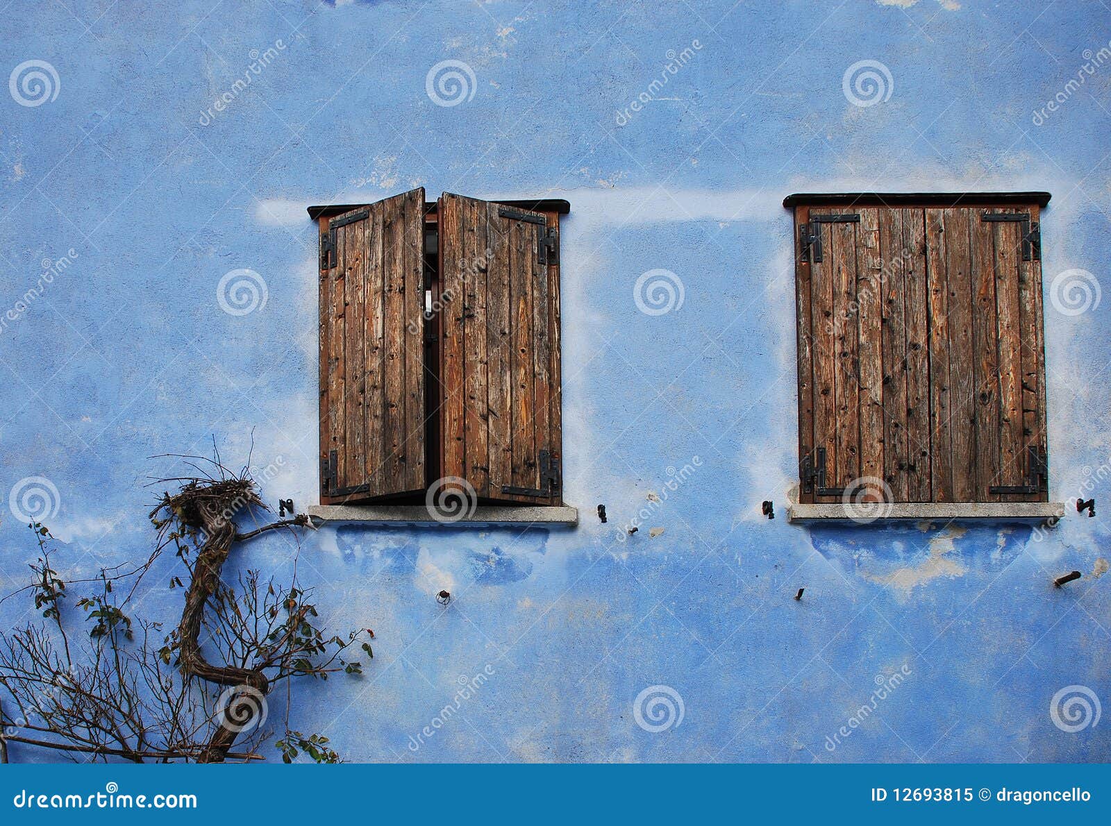 Two Windows in Blue Wall, Topolo Stock Image - Image of houses, wall ...