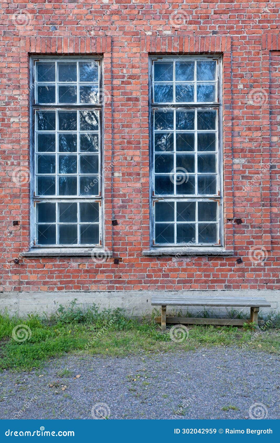 Two windows on brick wall. stock image. Image of brick - 302042959