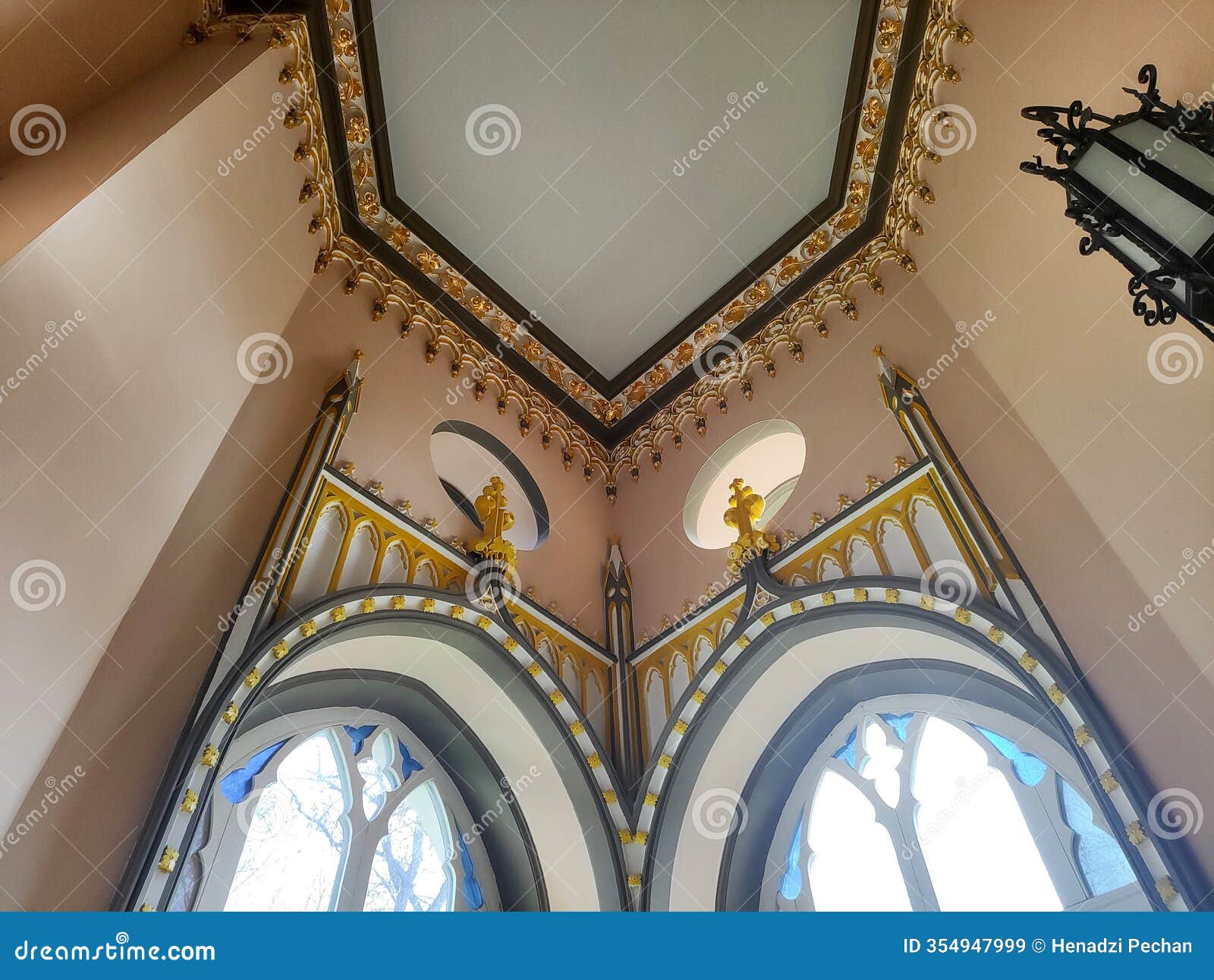 Two Windows with Multi-colored Glass and Patterns on the Ceiling and ...