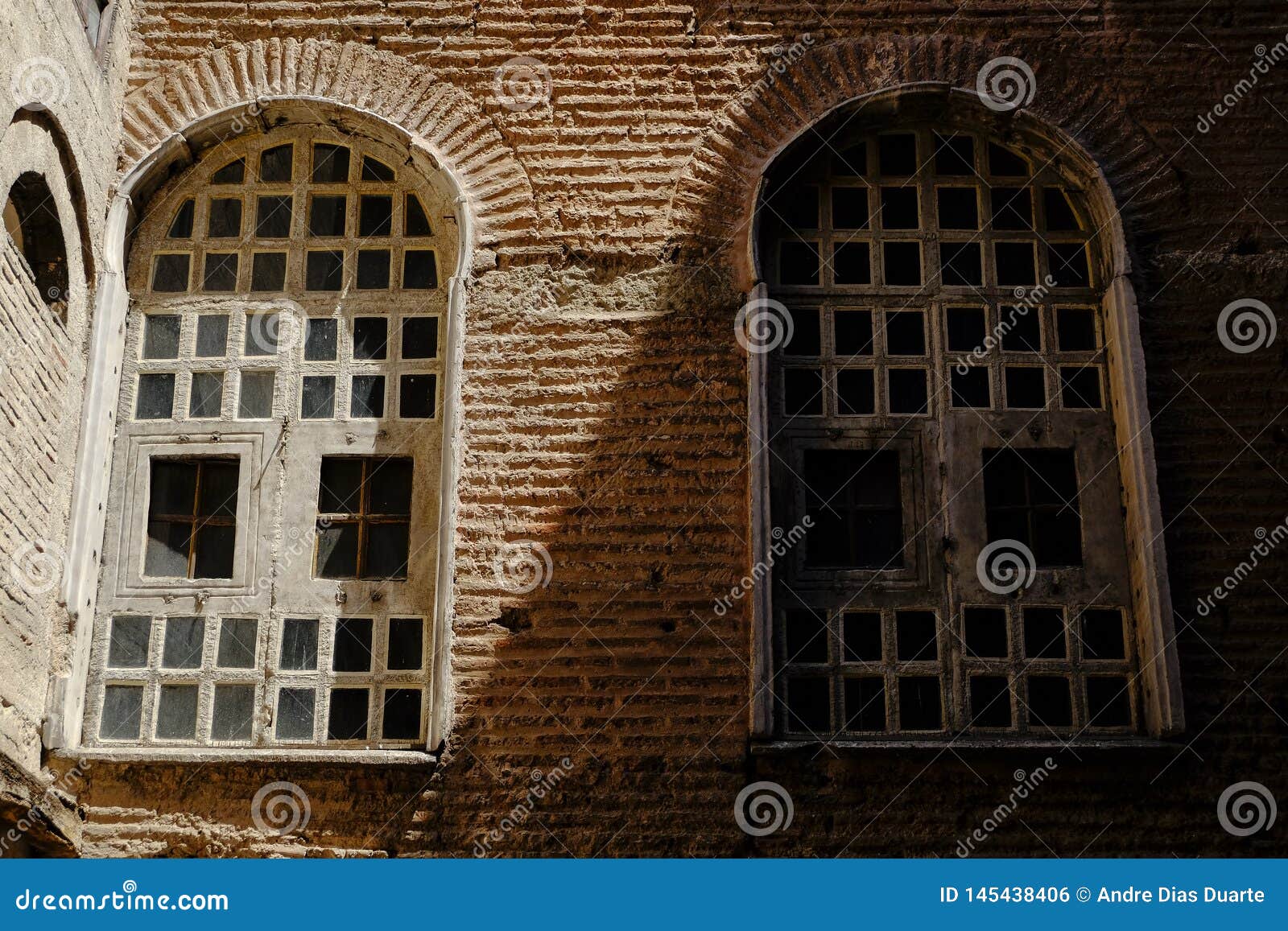 Two Windows in Shade and Light on Tile Brick Wall Stock Photo - Image ...