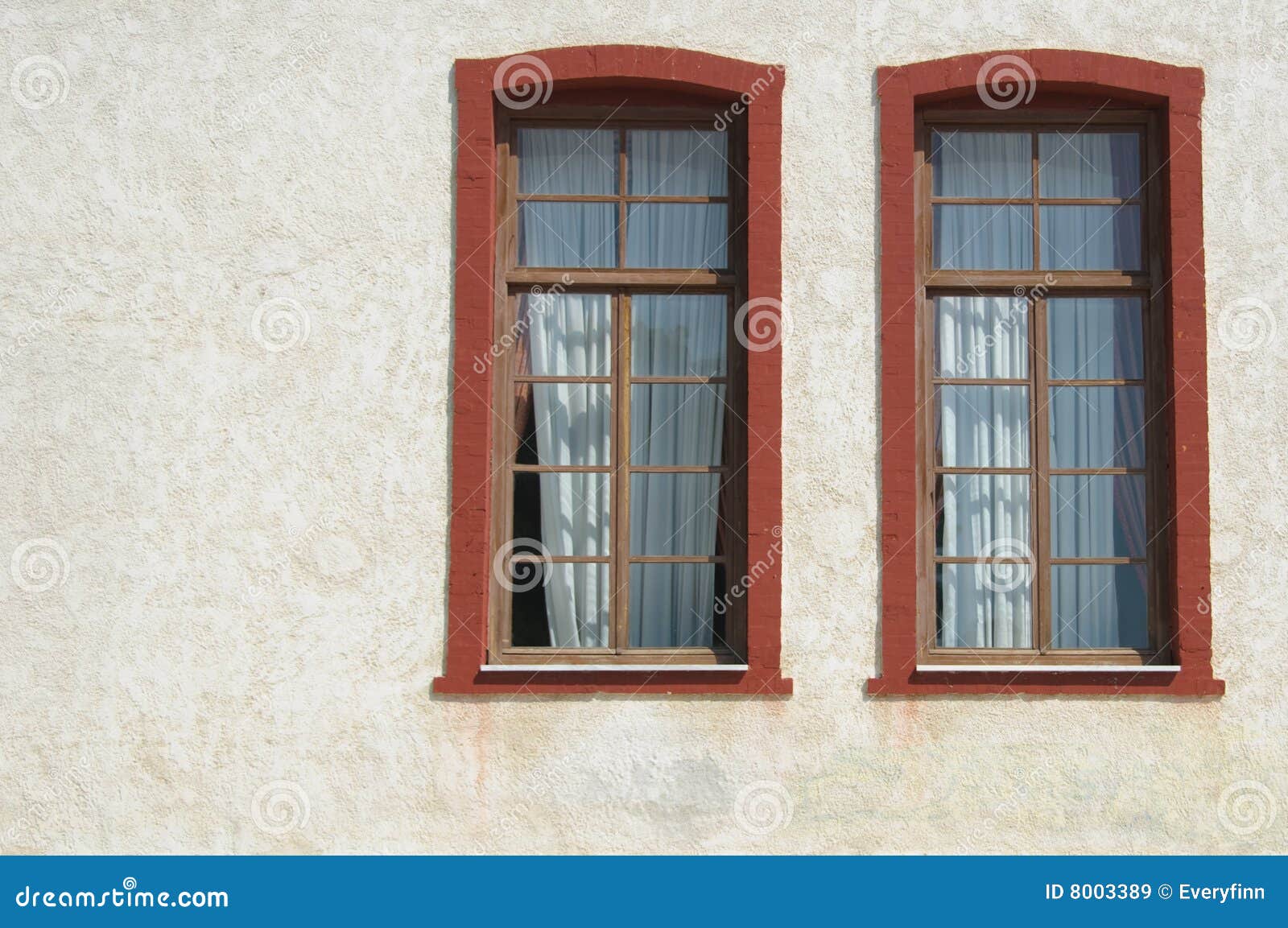 Two windows on white wall stock image. Image of curtains - 8003389