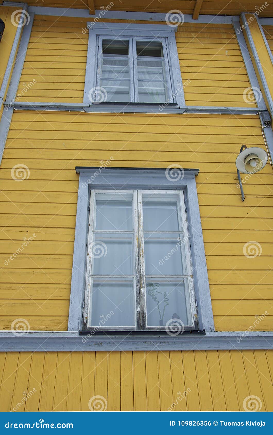 Two Windows in a Yellow Wall of a Building Stock Photo - Image of urban ...