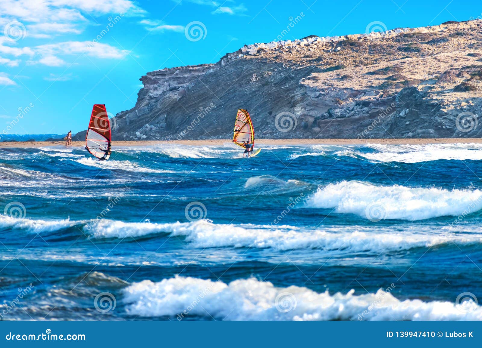 Two Windsurfers Surfing on Prasonisi Beach Rhodes, Greece Editorial ...