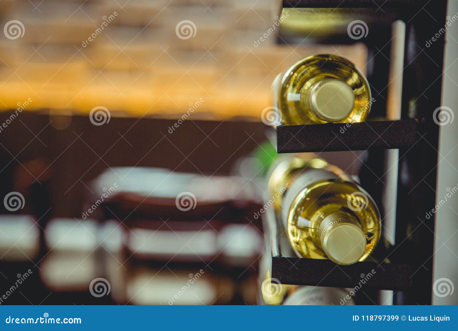 Two wine botles in a stand stock image. Image of restaurant - 118797399