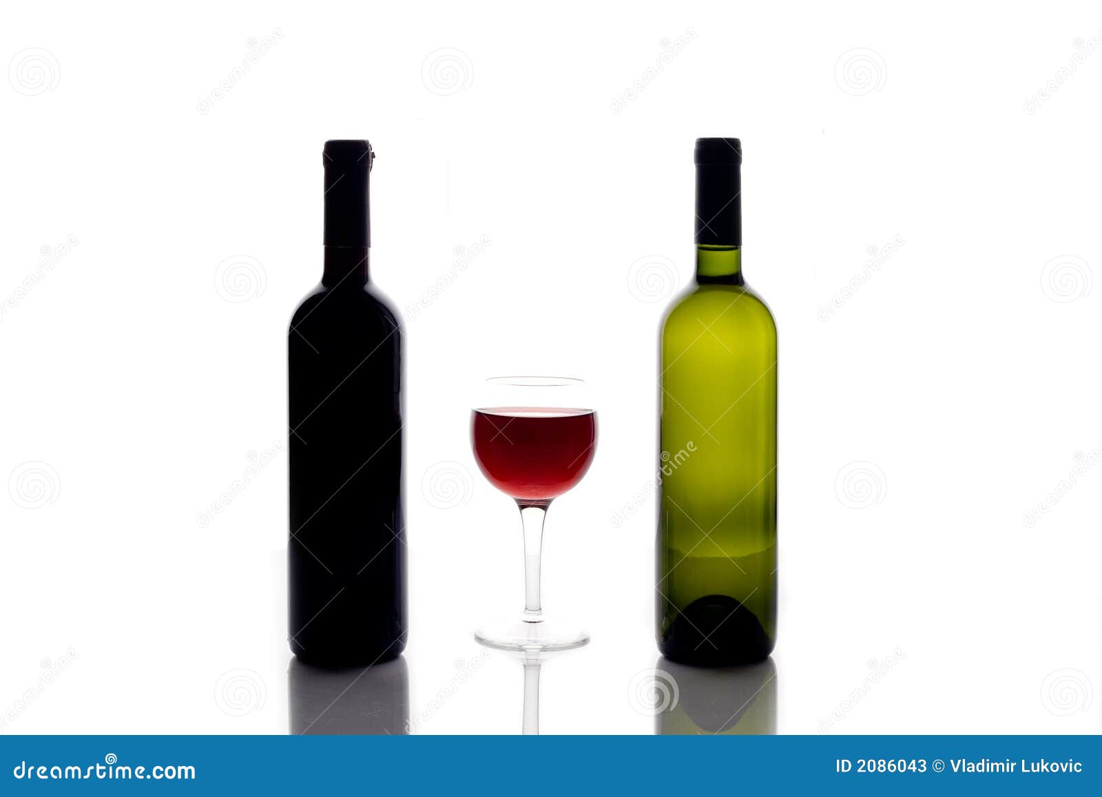 Two Wine Bottles and a Glass Stock Image - Image of alcoholic ...