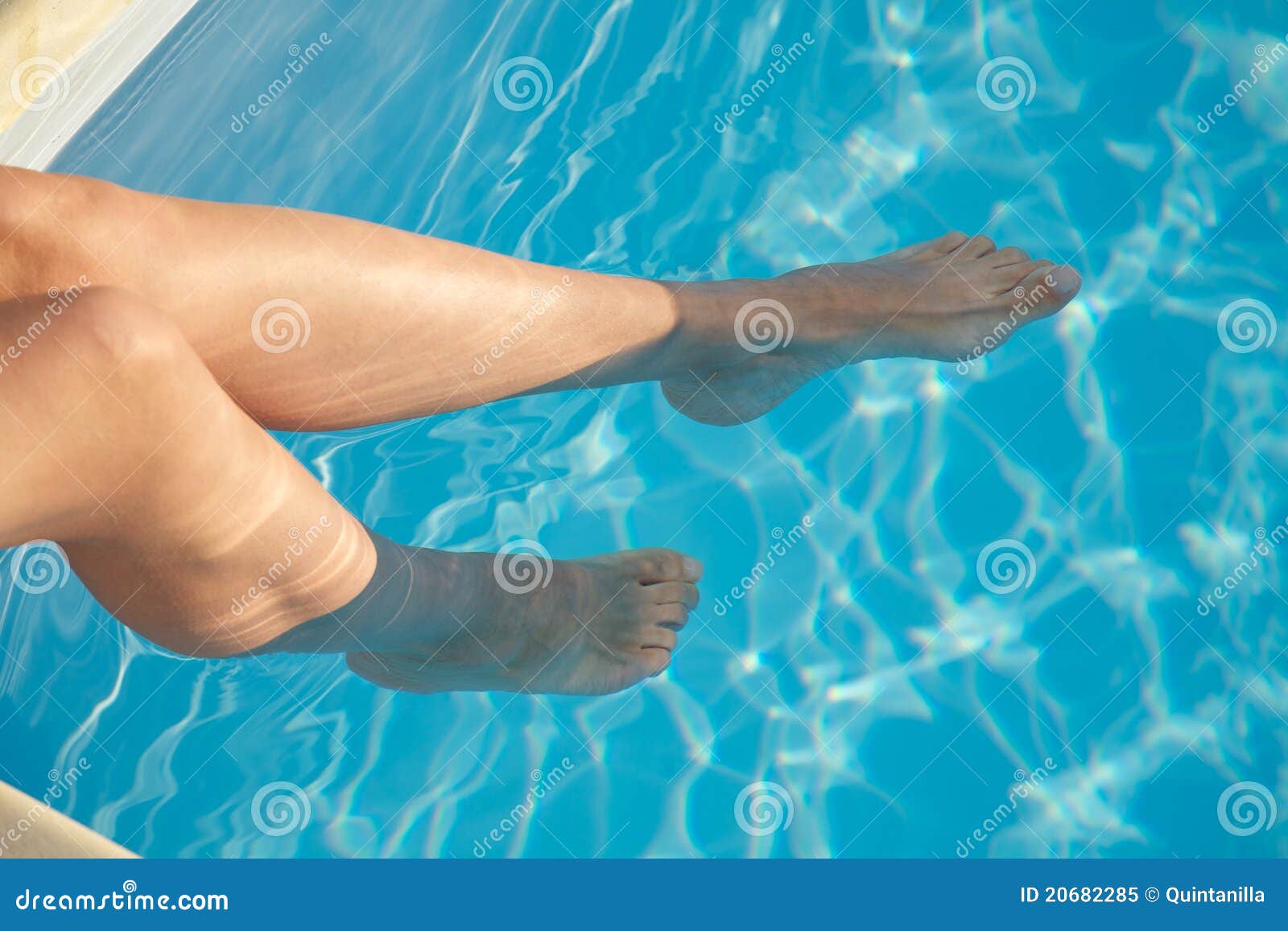 Two Woman Feet in Blue Pool Stock Image - Image of nail, holidays: 20682285