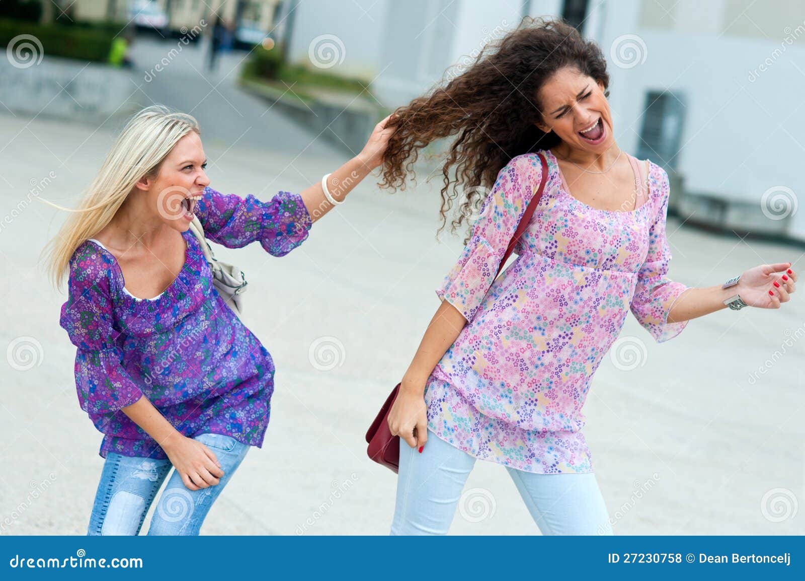 Two woman fight each other stock photo. Image of pulling - 27230758
