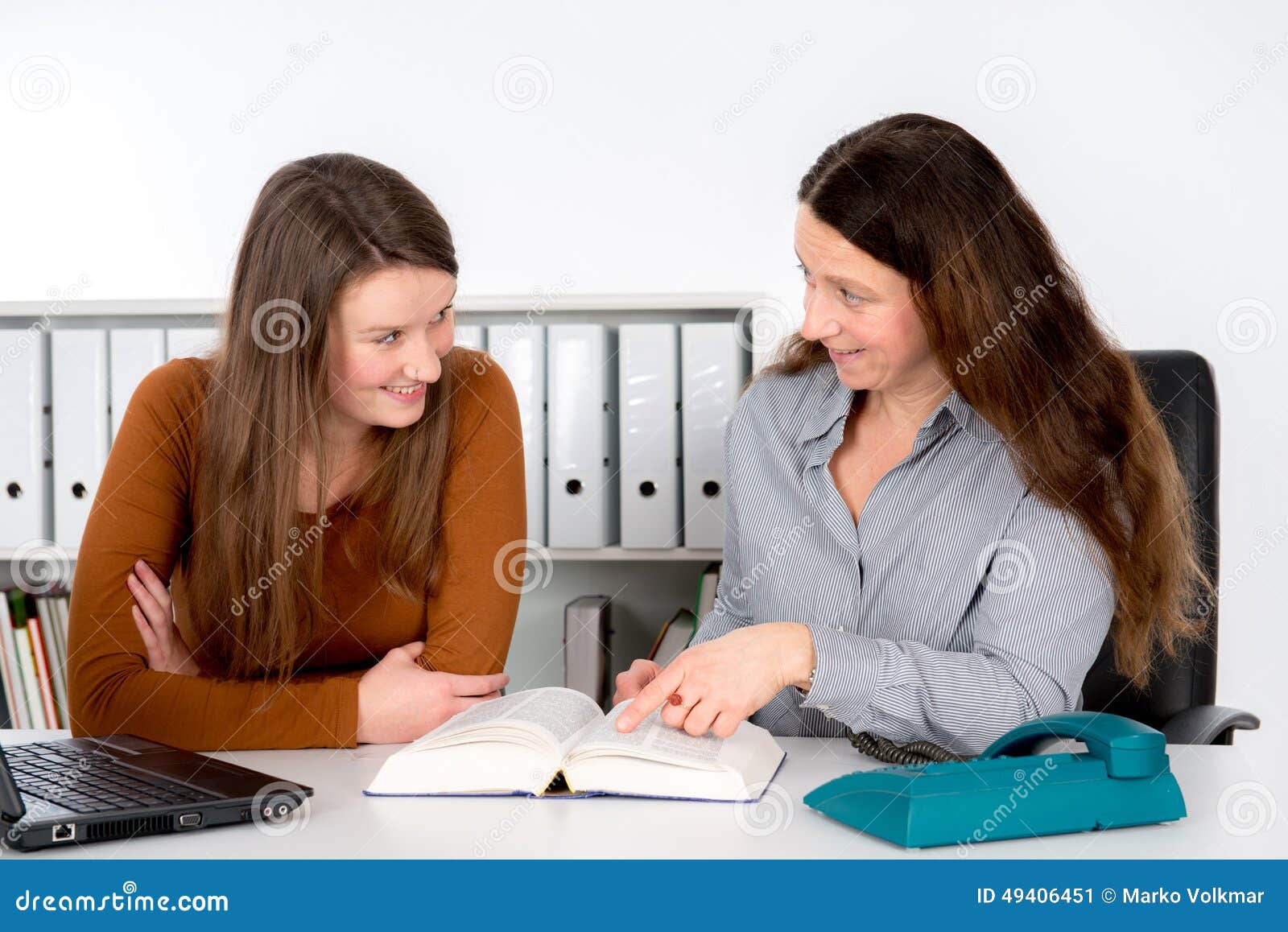 Two woman in good teamwork stock image. Image of conversation - 49406451