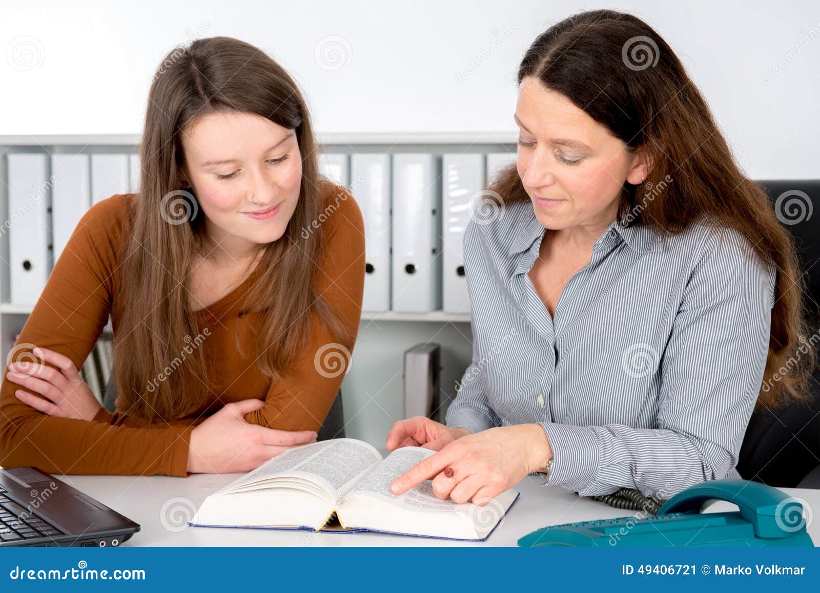 Two woman in good teamwork stock image. Image of conversation - 49406721