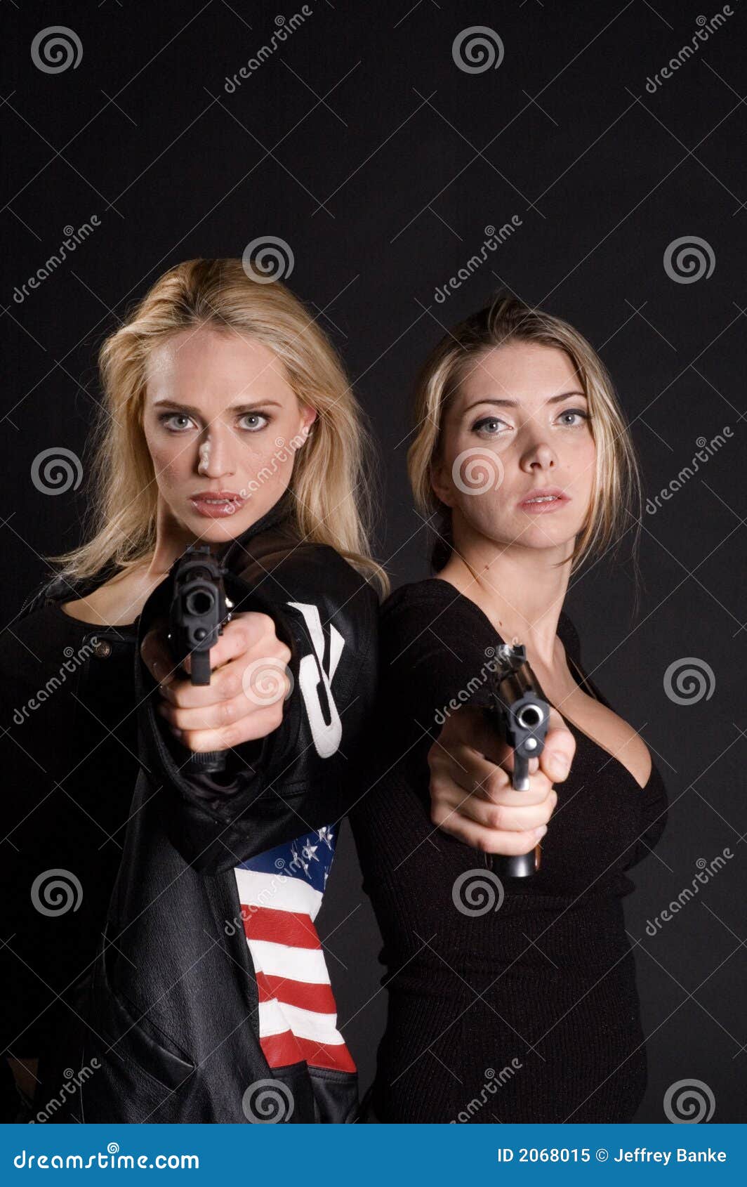 Two woman with guns stock image. Image of buxom, guns - 2068015