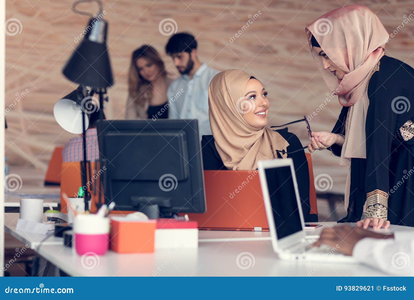 Two Woman With Hijab Working On Laptop In Office Stock Image Image