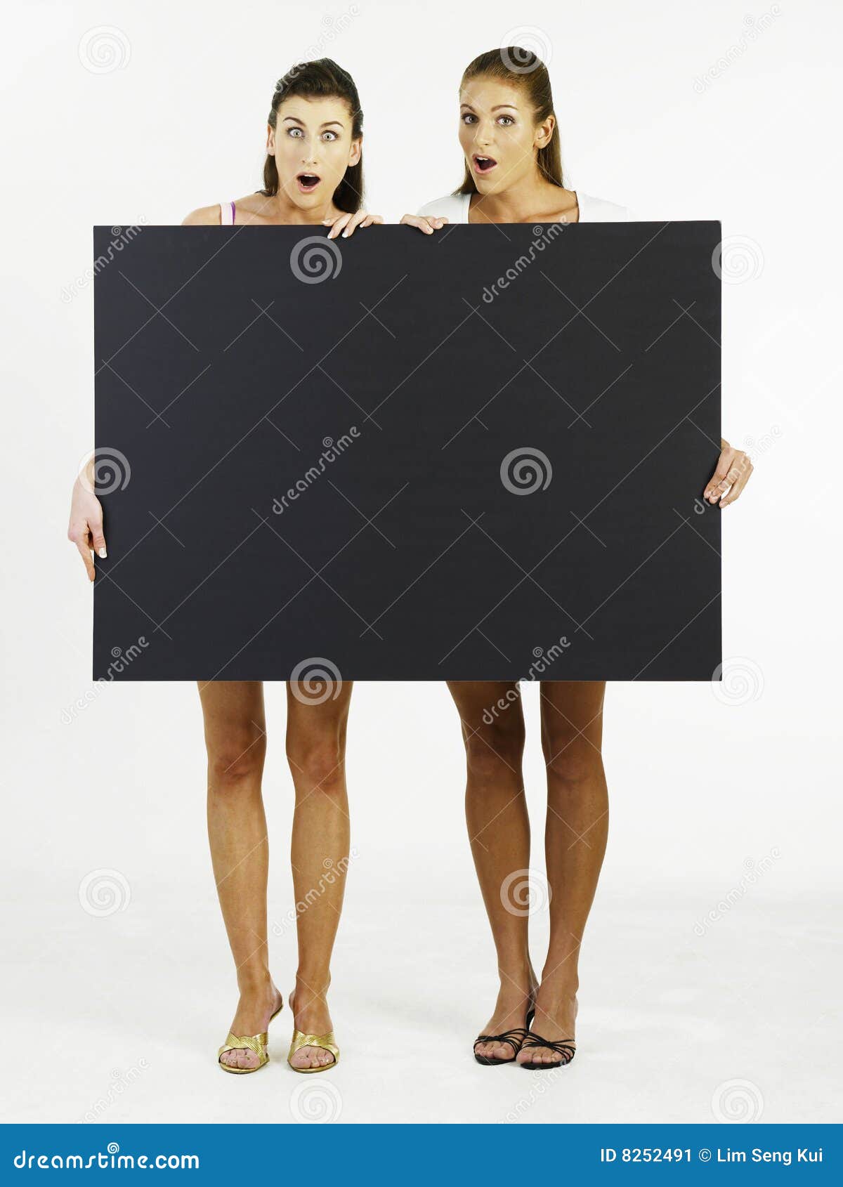 Two woman holding card stock image. Image of showing, facial - 8252491