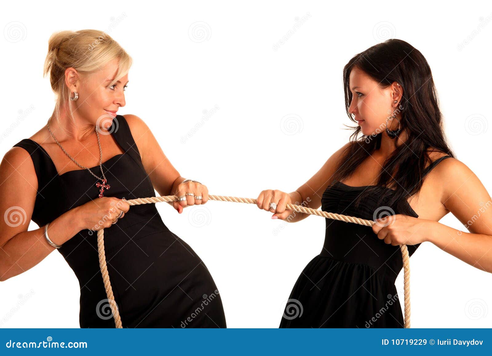 Two Woman Mother and Daughter Pull the Rope Stock Image - Image of ...