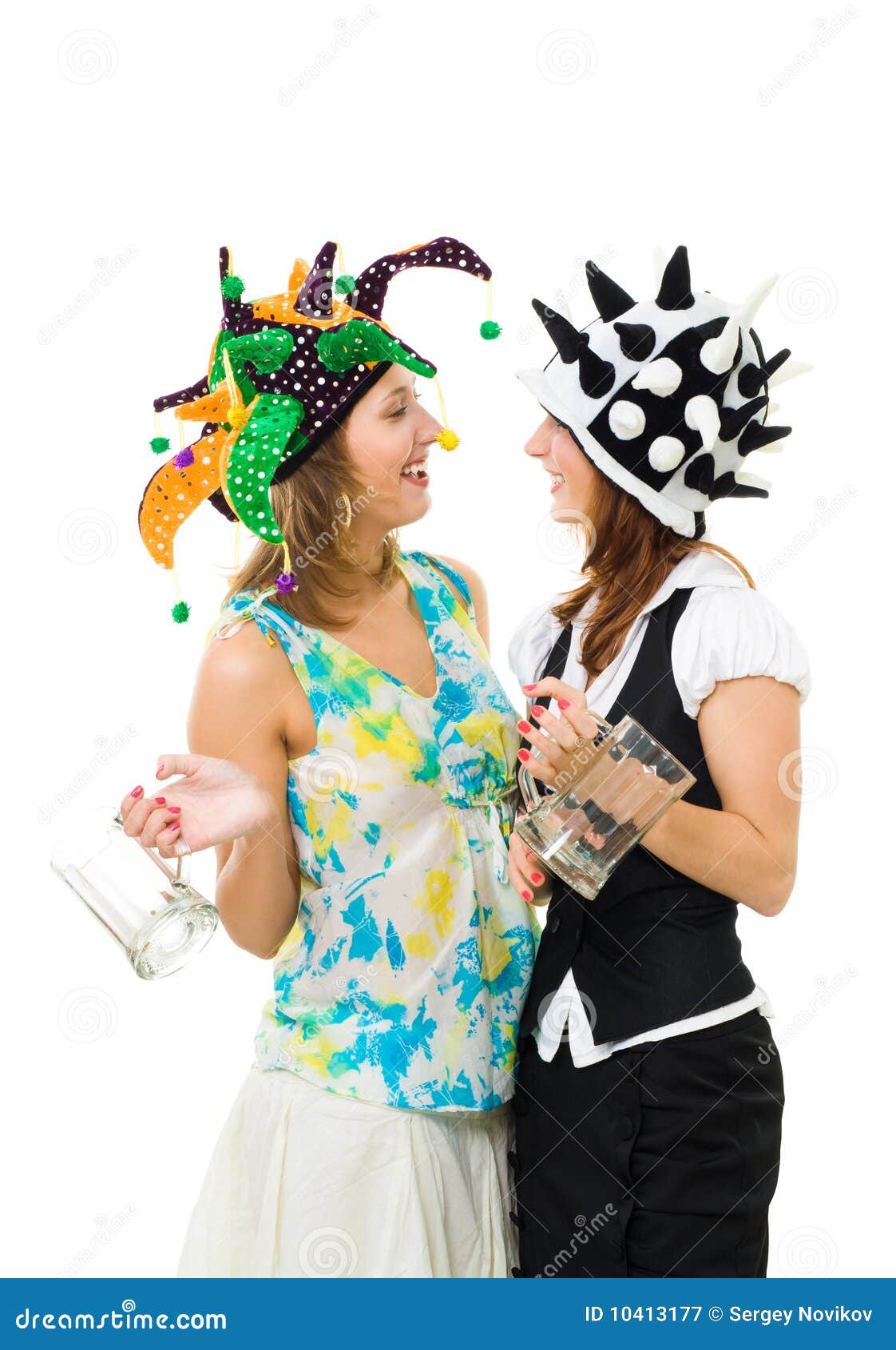Two Woman Talking in Jester Hats Stock Image - Image of black ...