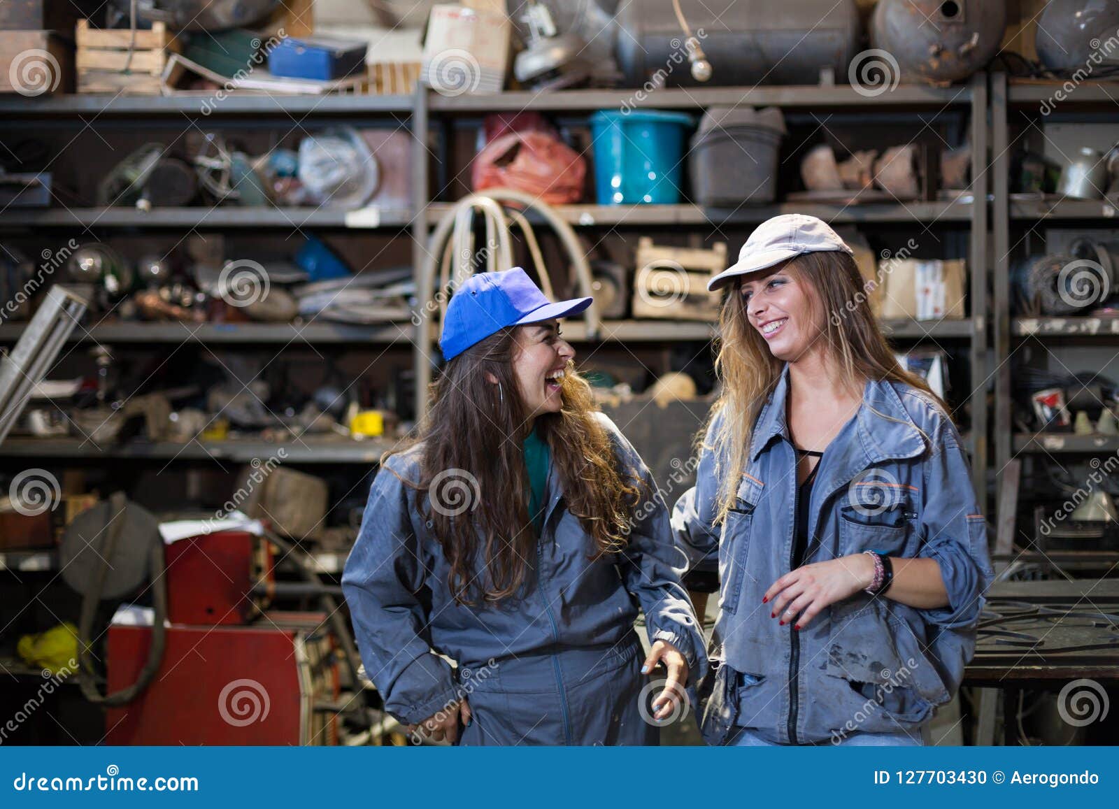 Two Women Apprentices in a Workshop Stock Photo - Image of shop ...