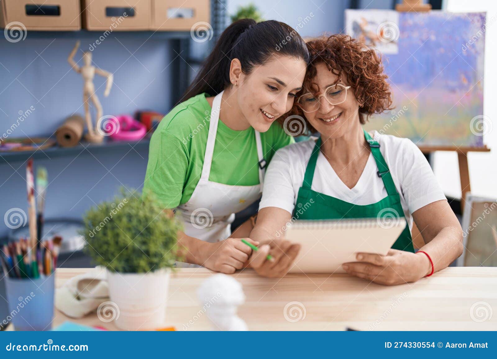 Two Women Artists Drawing on Notebook at Art Studio Stock Photo - Image ...