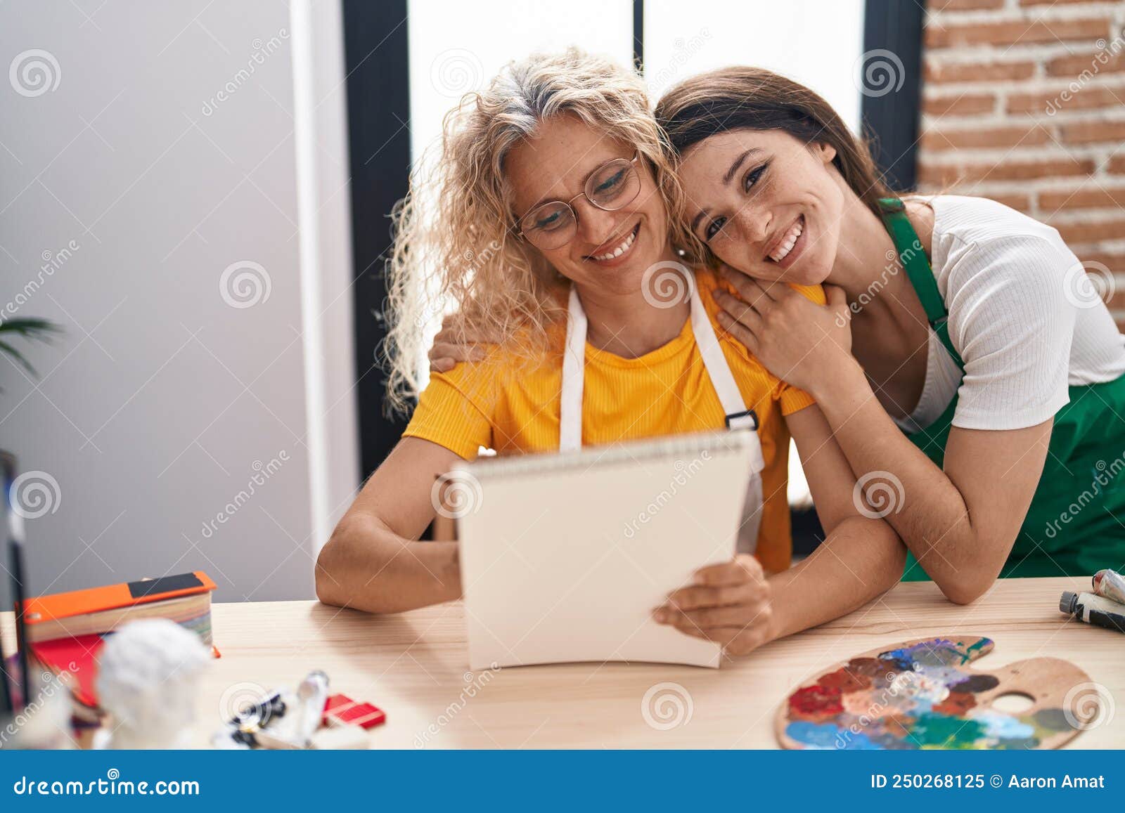 Two Women Artists Smiling Confident Drawing on Notebook at Art Studio ...