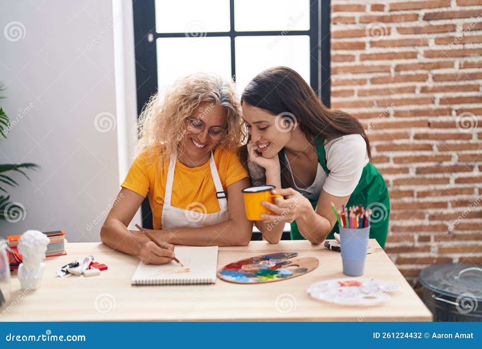 Two Women Artists Smiling Confident Drawing on Notebook at Art Studio ...