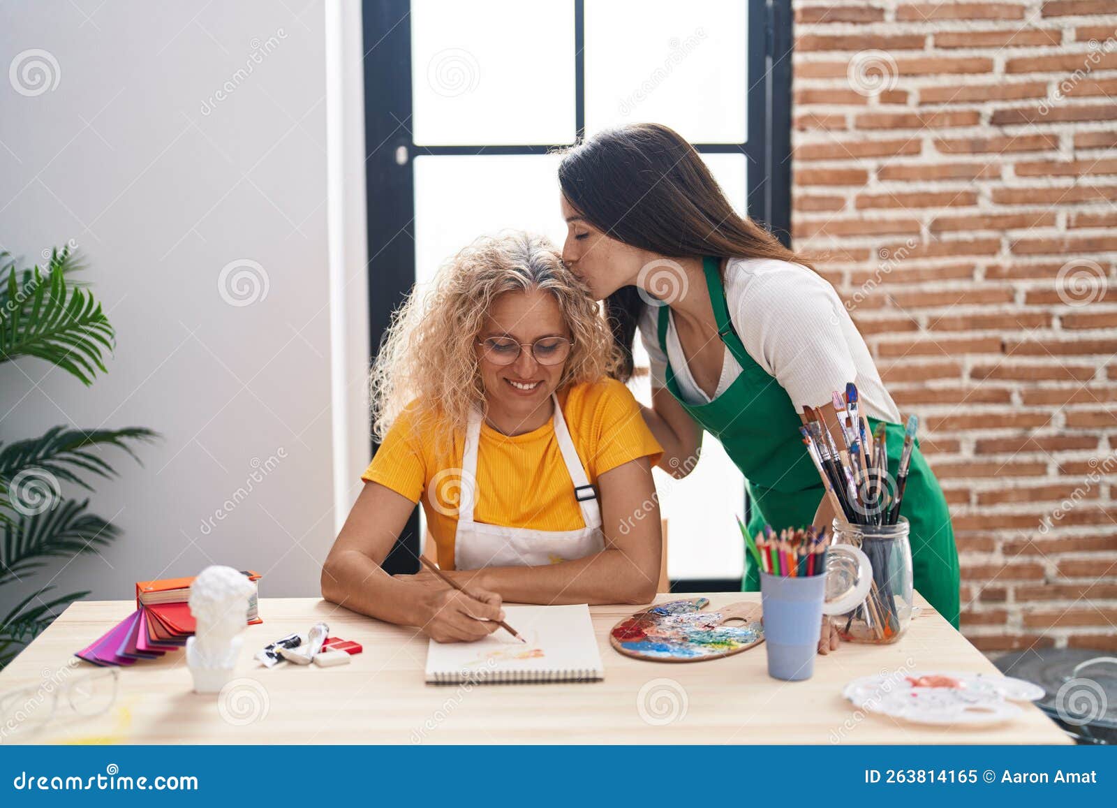 Two Women Artists Smiling Confident Drawing on Notebook at Art Studio ...
