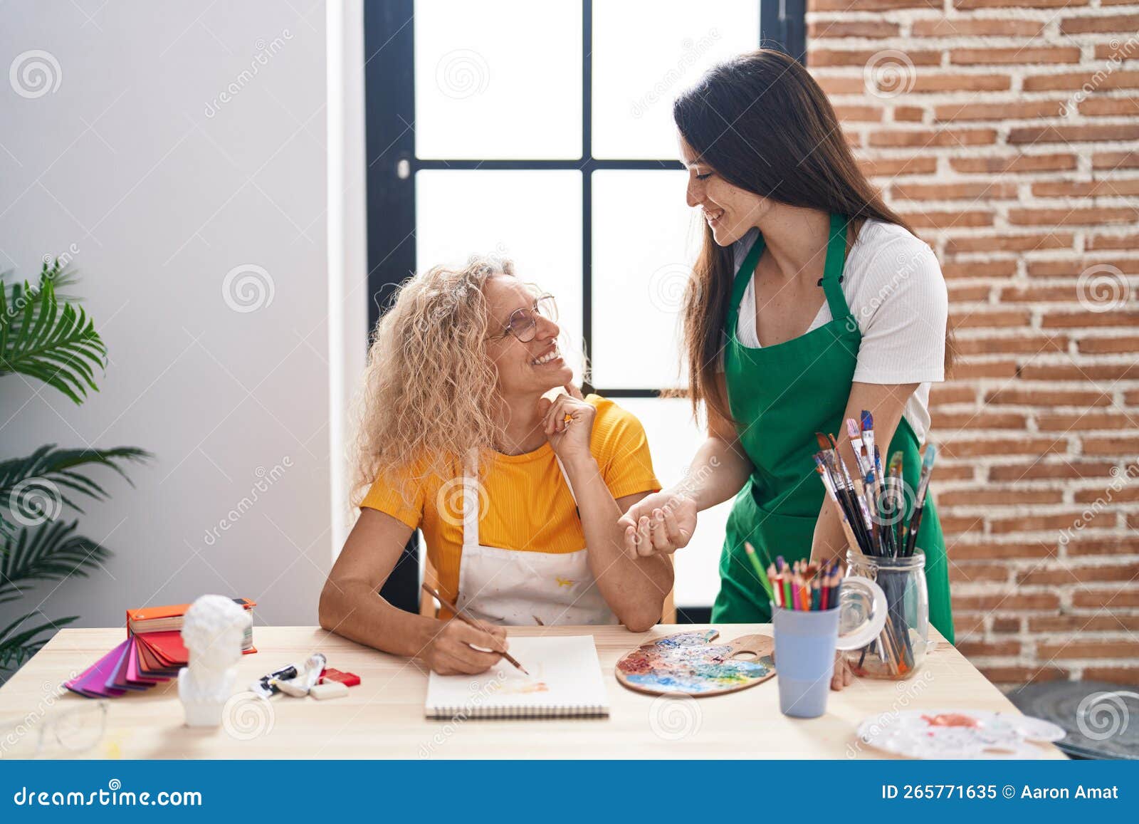 Two Women Artists Smiling Confident Drawing on Notebook at Art Studio ...